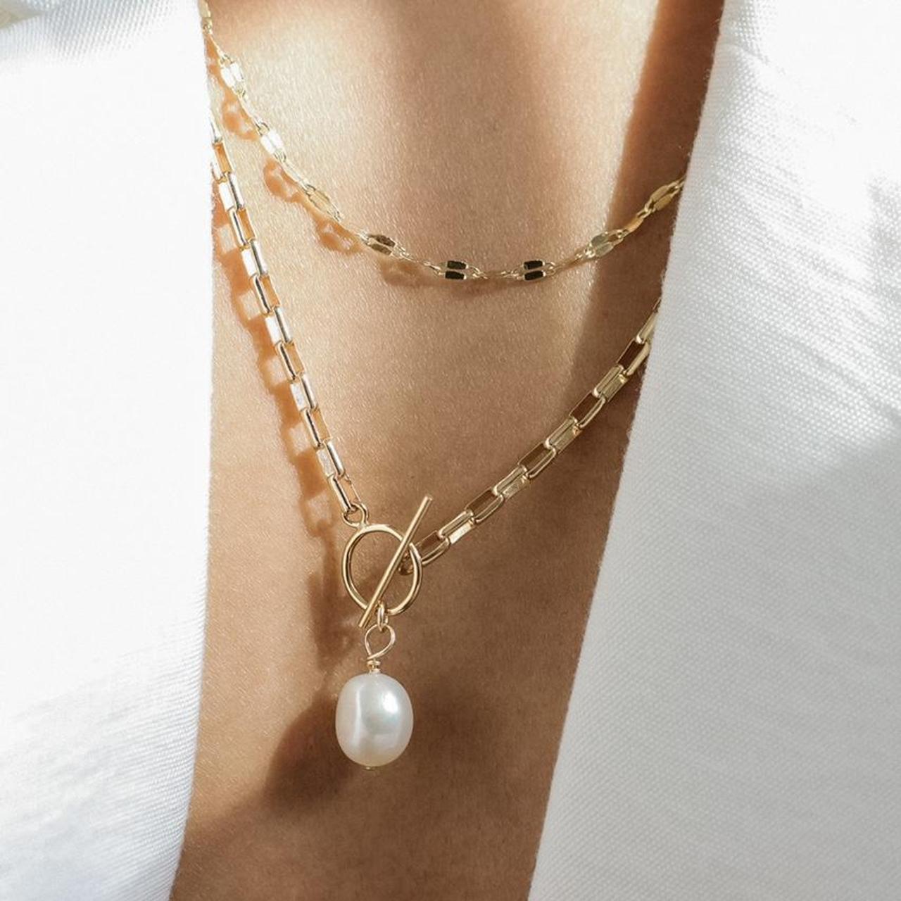 JULIA Our Julia necklace features a freshwater... - Depop