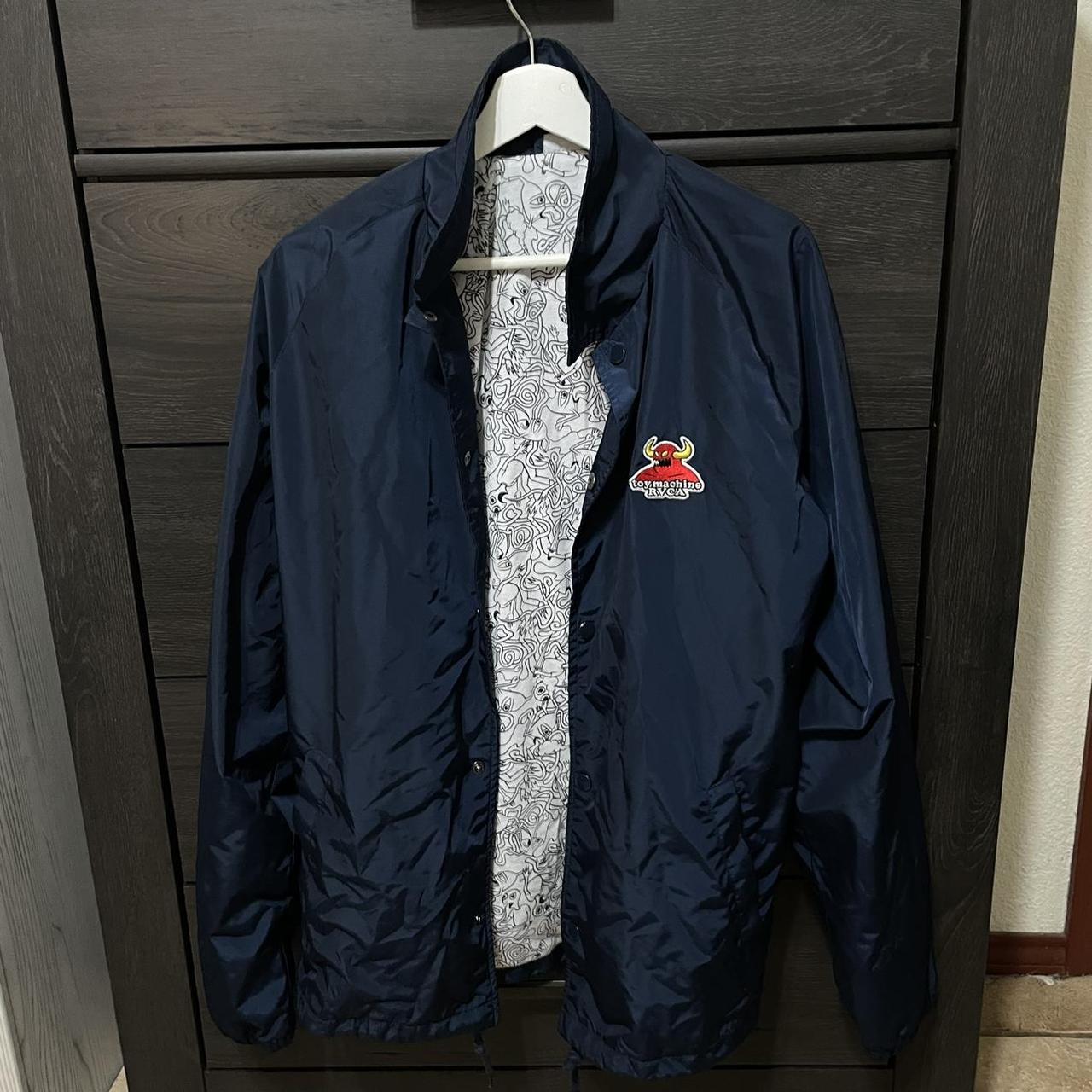 navyish color toy machine jacket, the inside is... - Depop