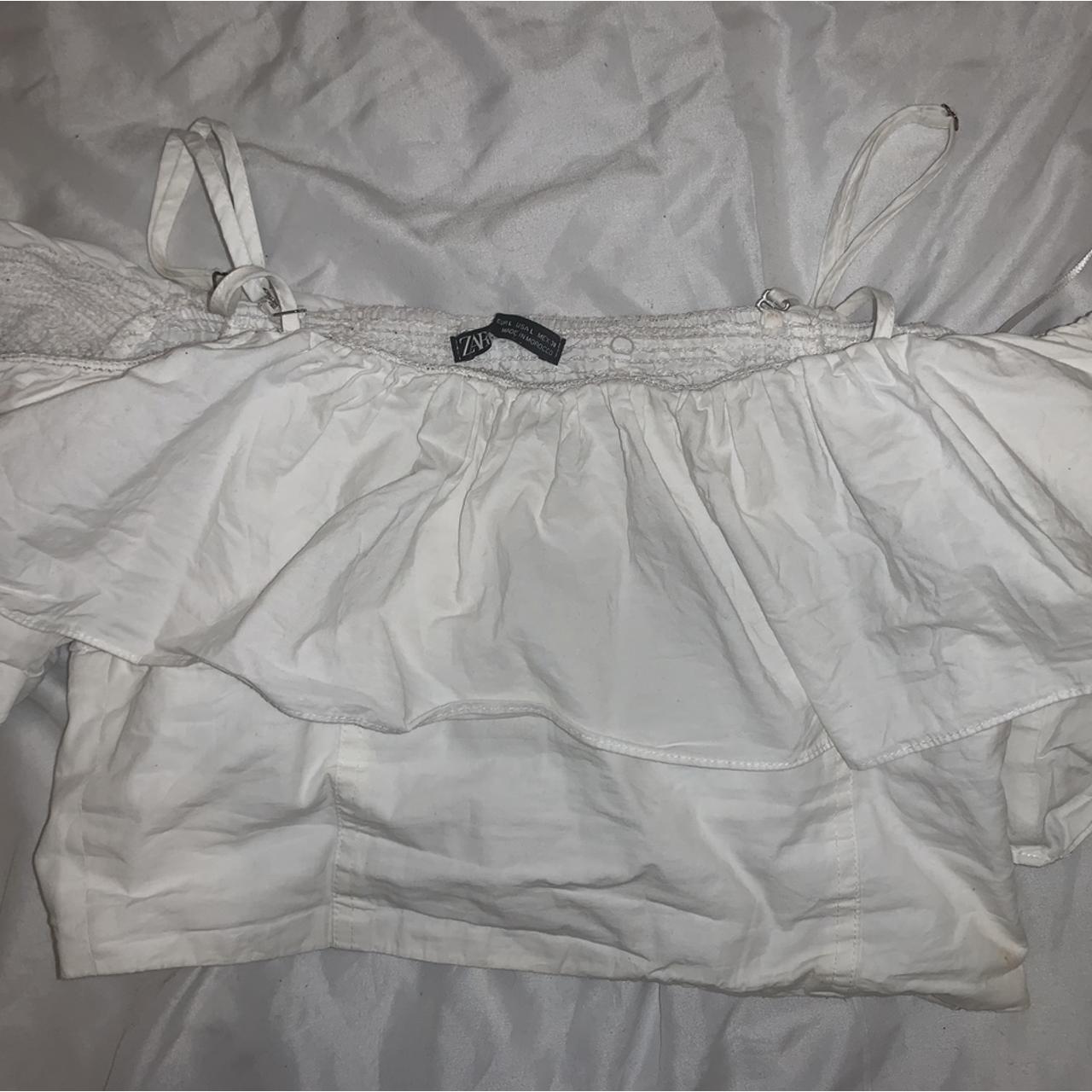 White ruffly top from Zara. Only worn once, it is in... - Depop