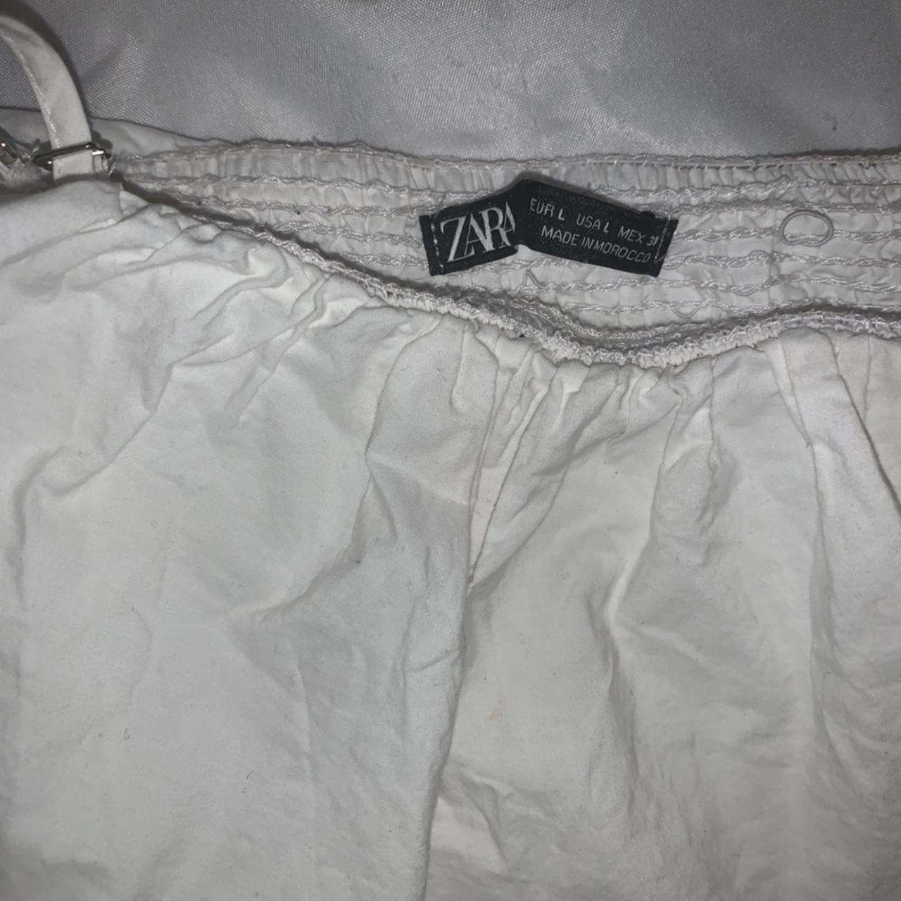 White ruffly top from Zara. Only worn once, it is in... - Depop