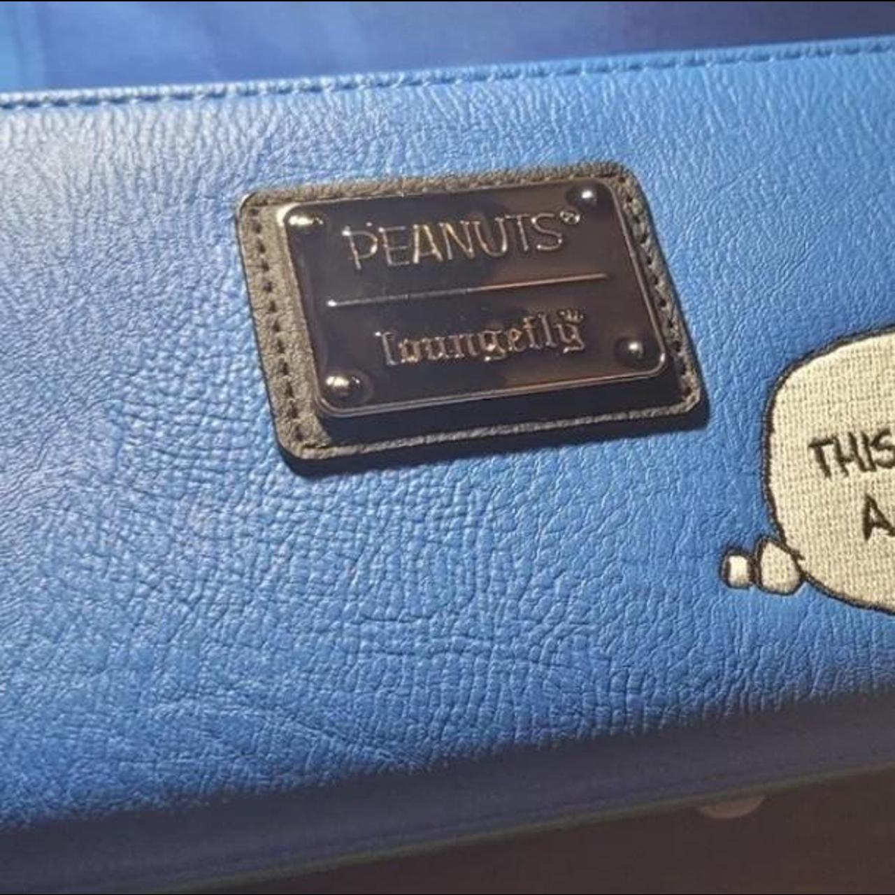 Snoopy wallet brand new Only used once or twice... - Depop