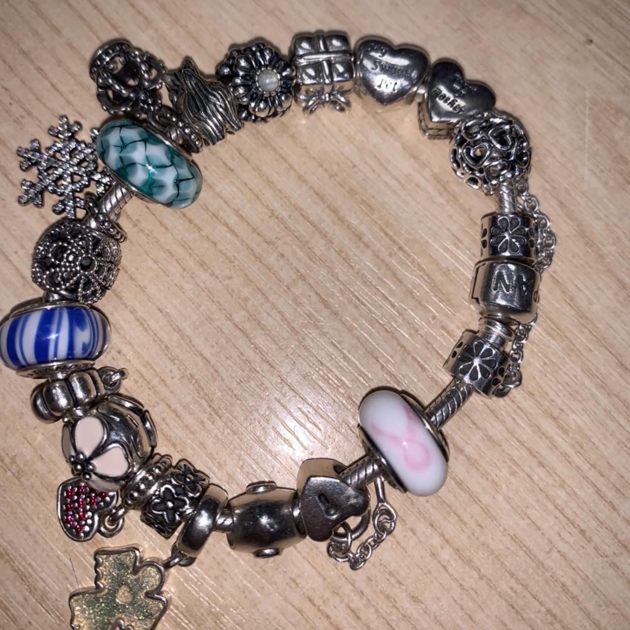 Genuine pandora bracelet and charms £10 per charm... - Depop