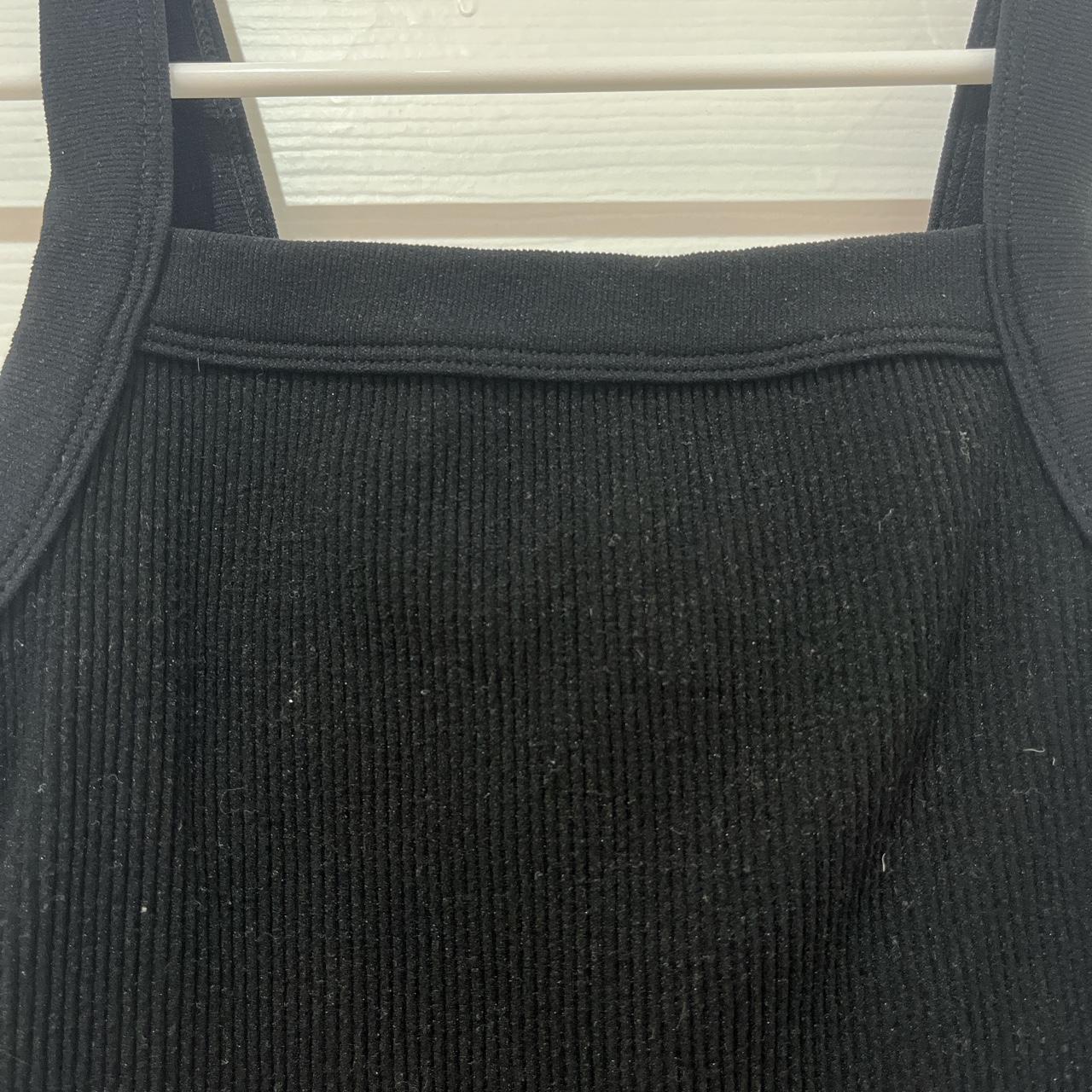 Black cropped tank top. Super cute black ribbed... - Depop