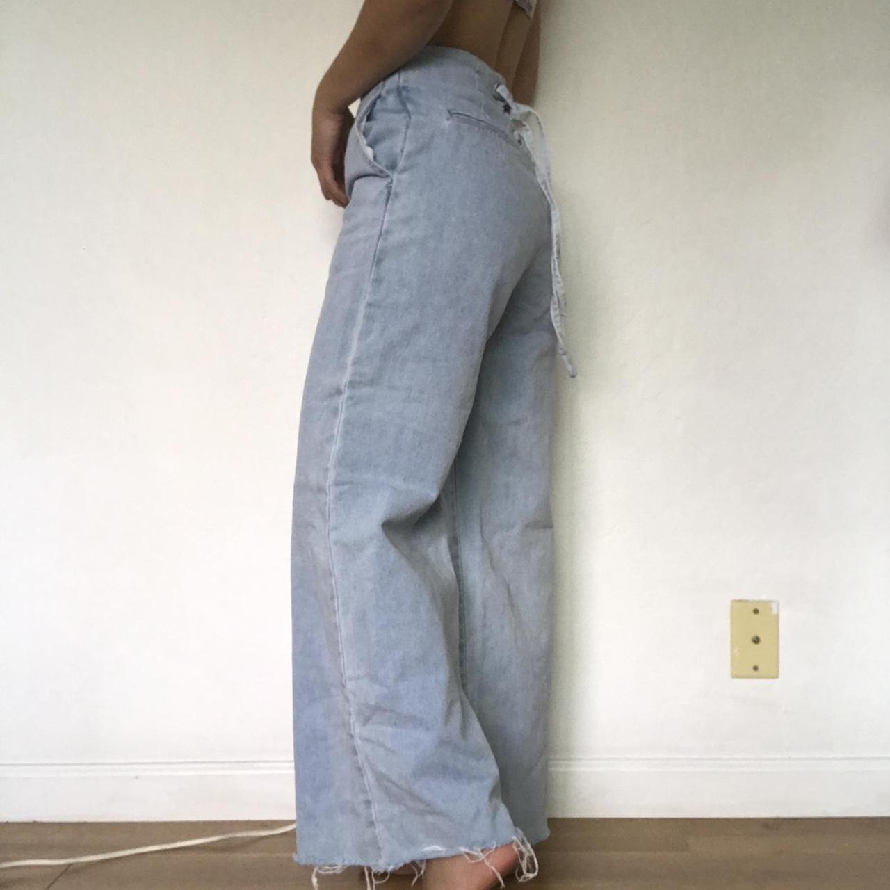 High waisted jeans with lace up back Excellent... - Depop