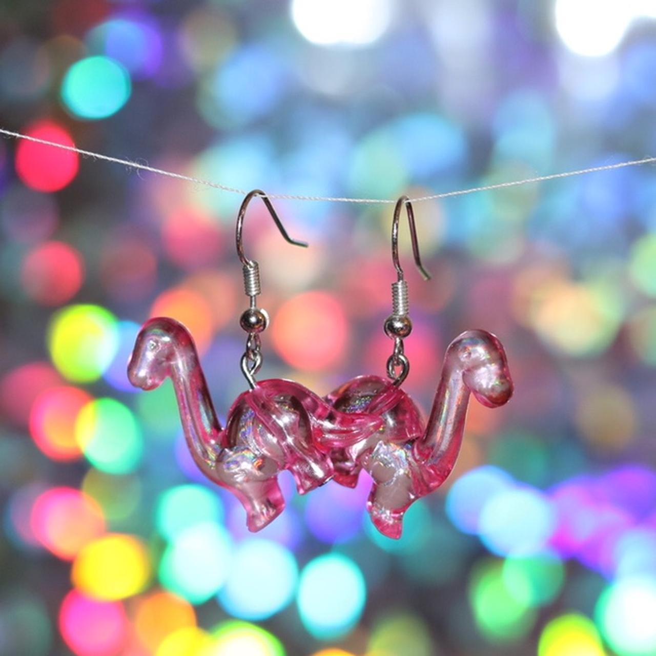 LIGHT PINK SEE THROUGH DINOSAUR EARRINGS... - Depop