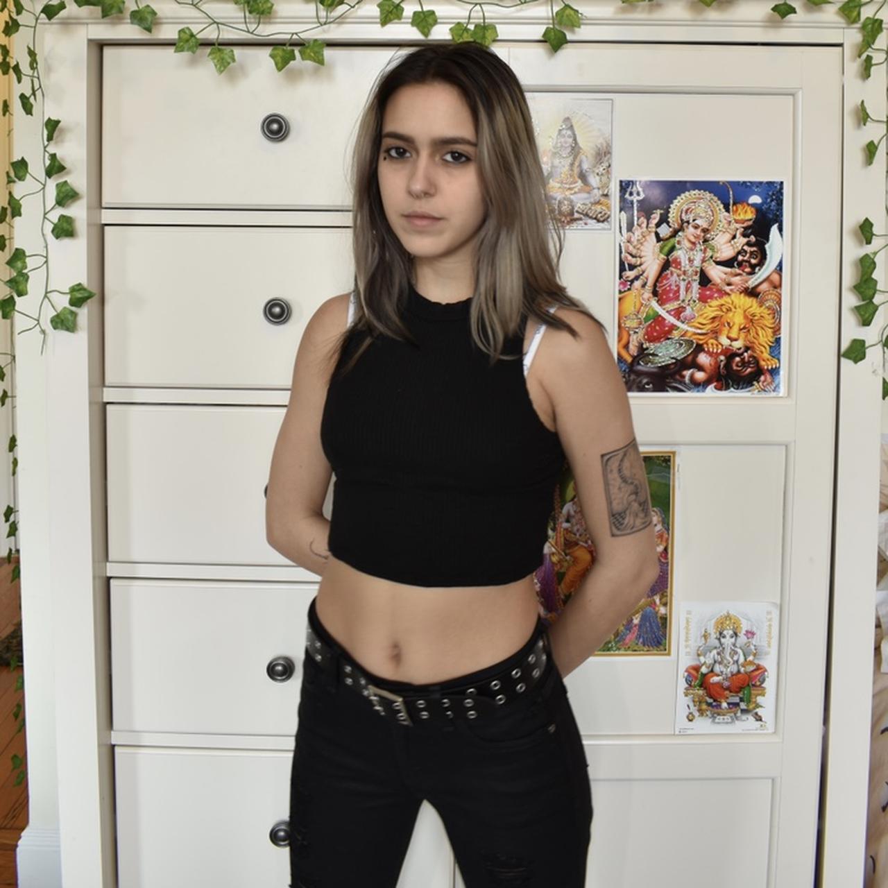 Black cropped tank top also stretchy, size s. Model... - Depop
