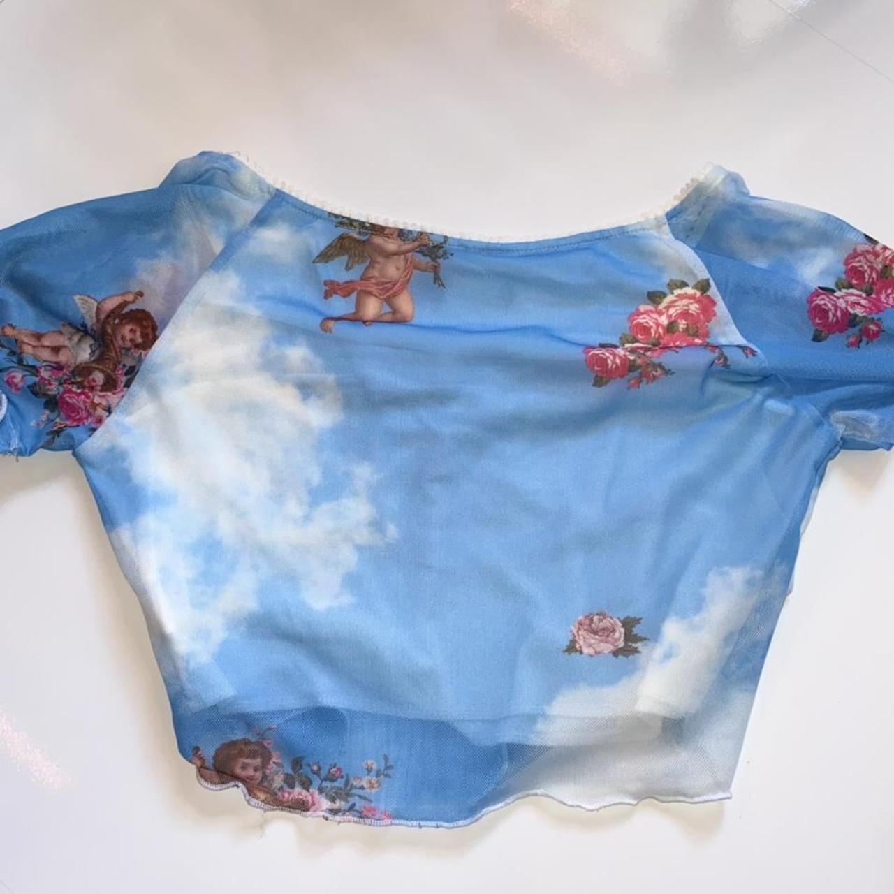 Blue angel crop top Great condition S - Depop