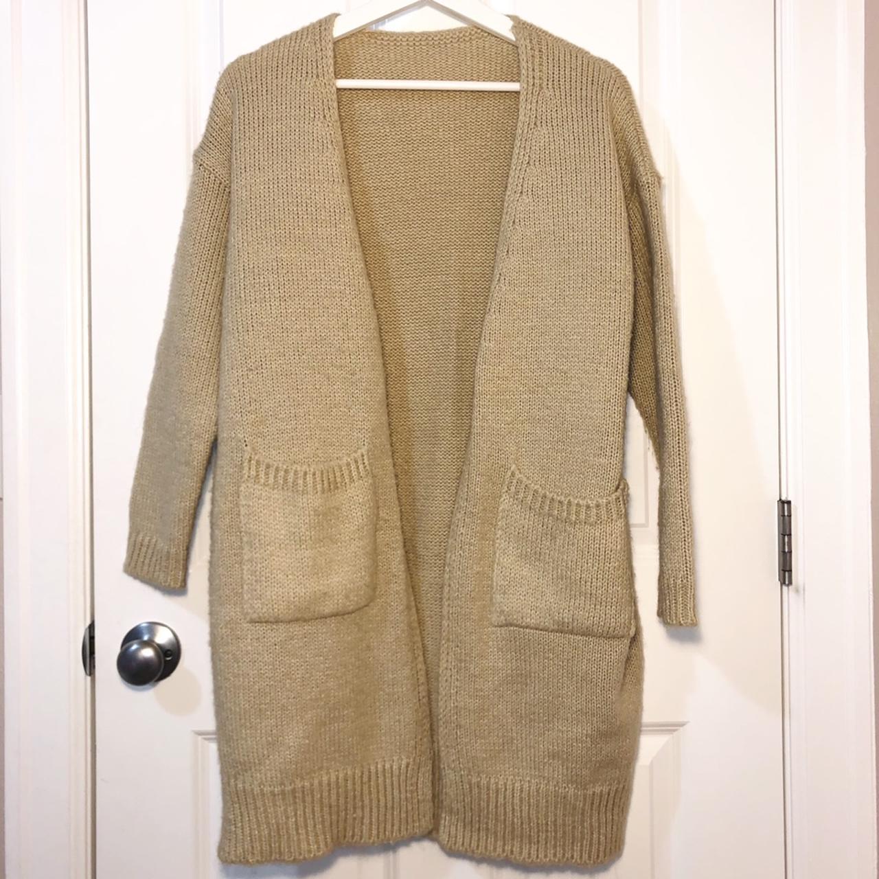 Beautiful tan cardigan that is mid-thigh length!... - Depop