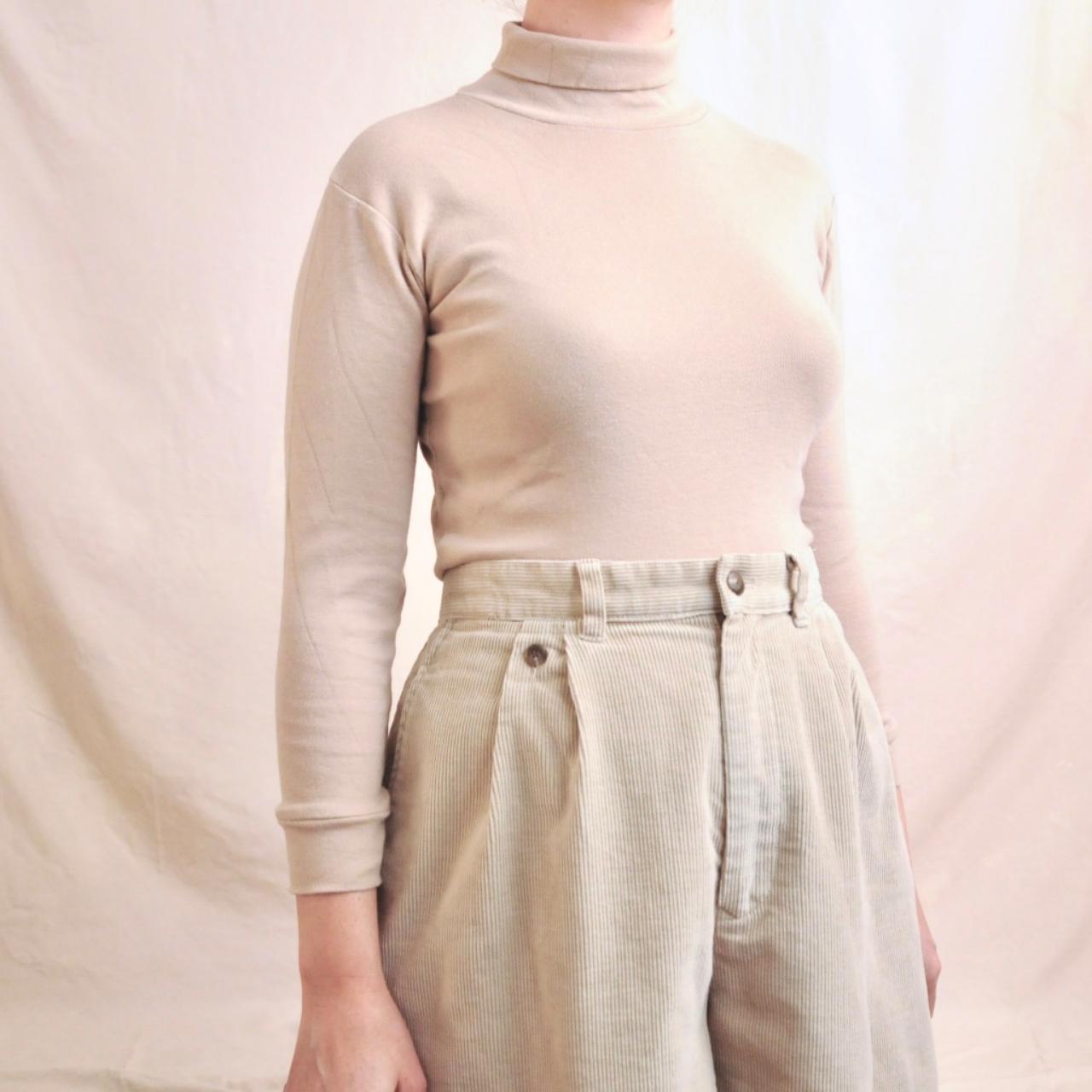 Itty bitty beige turtle neck. Perfect for layering... - Depop