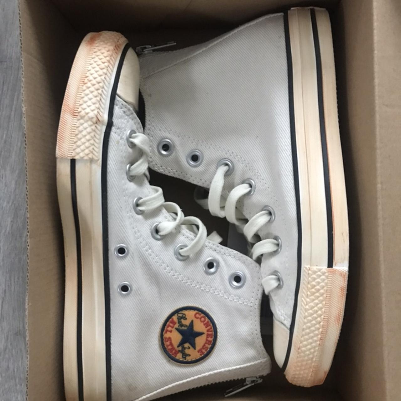 White converse high tops with a rust washed... - Depop