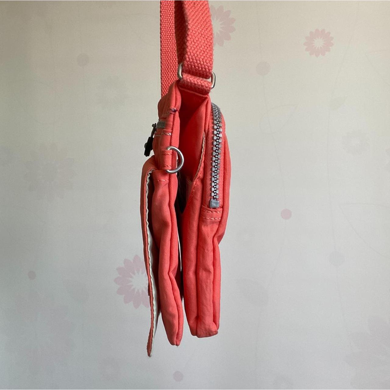 Coral Kipling Crossbody Bag An everyday, functional... - Depop