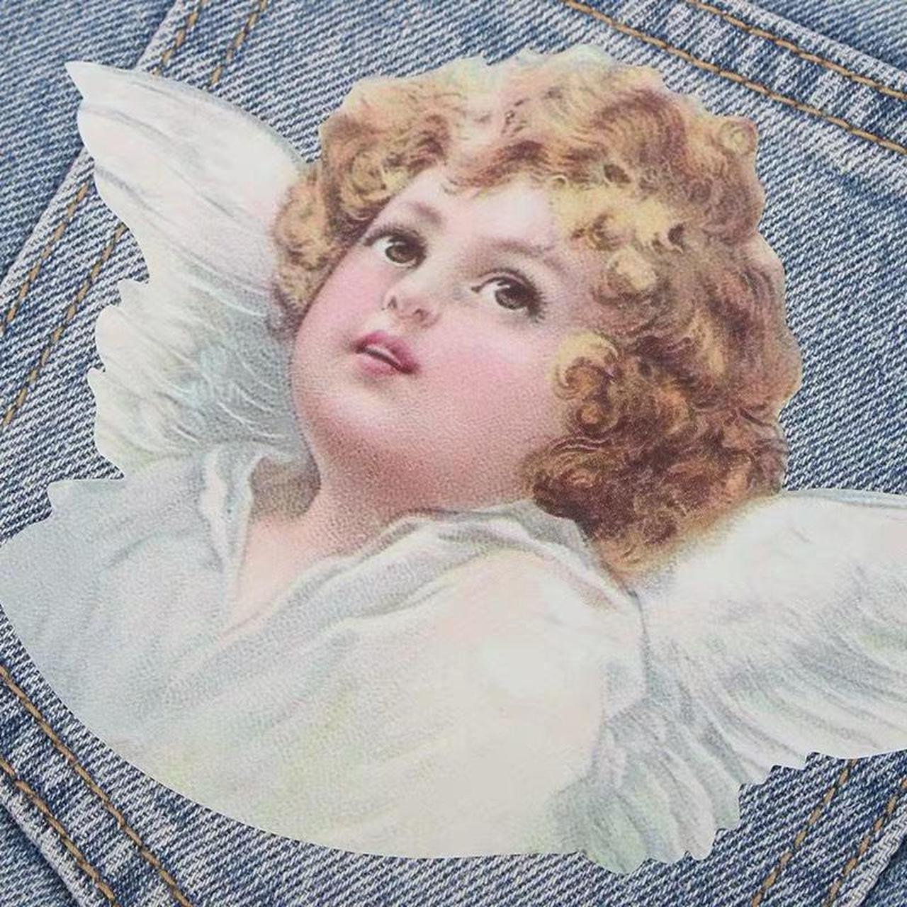 Vintage jeans and angel prints size M - Depop