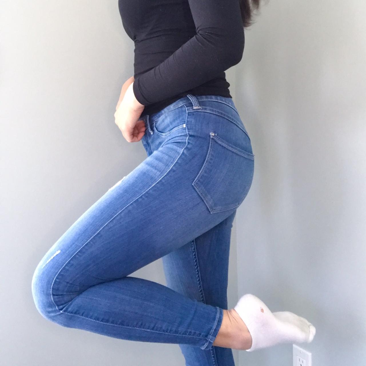 HOLLISTER high-rise slightly ripped jean leggings in... - Depop