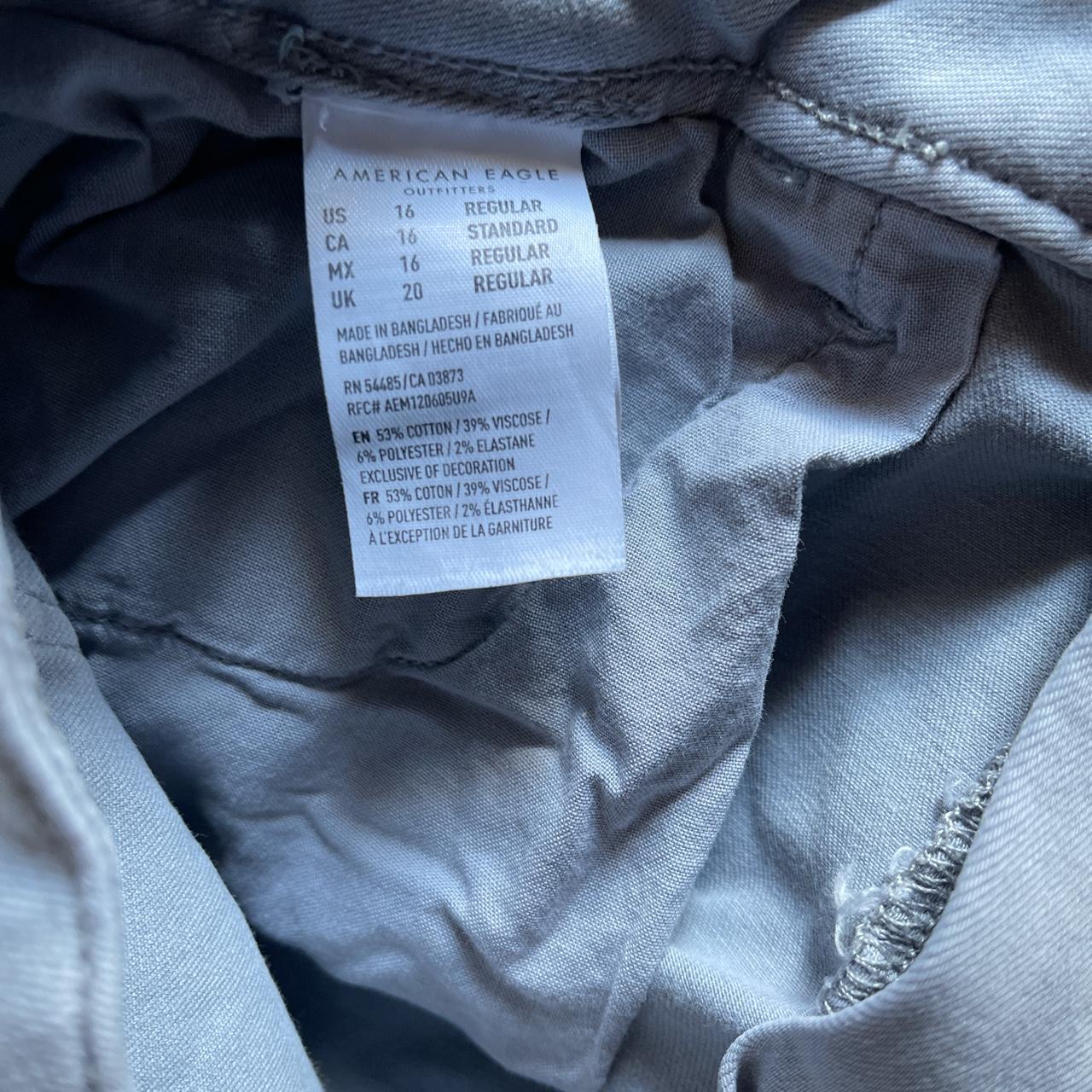 Grey Ripped American Eagle Jeans Size: 16, can fit... - Depop