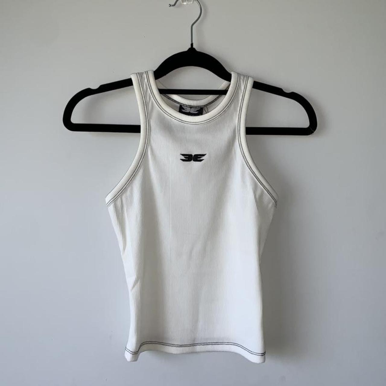Elite Eleven white ribbed singlet with black... - Depop