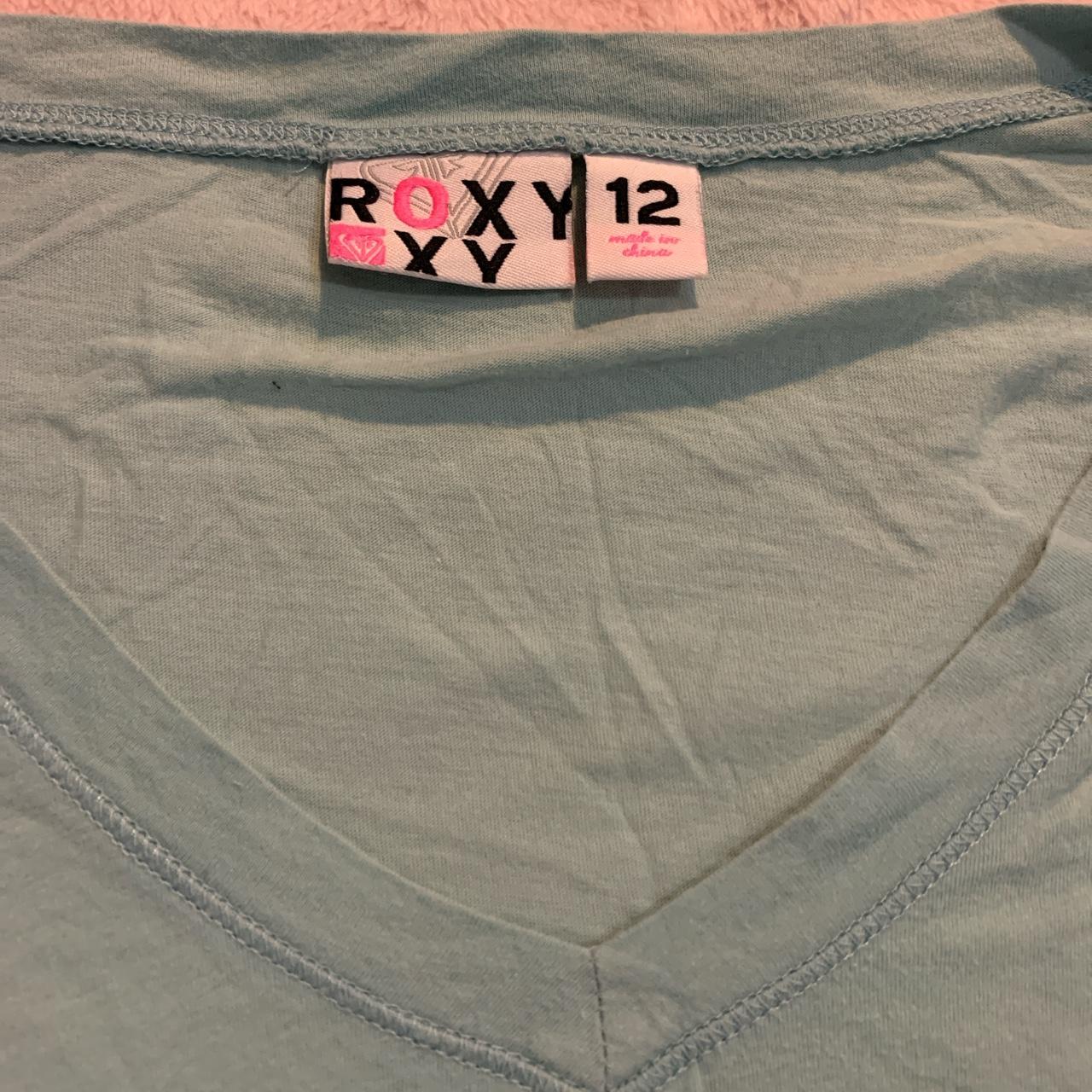Vintage green Roxy shirt Design goes across to back... - Depop