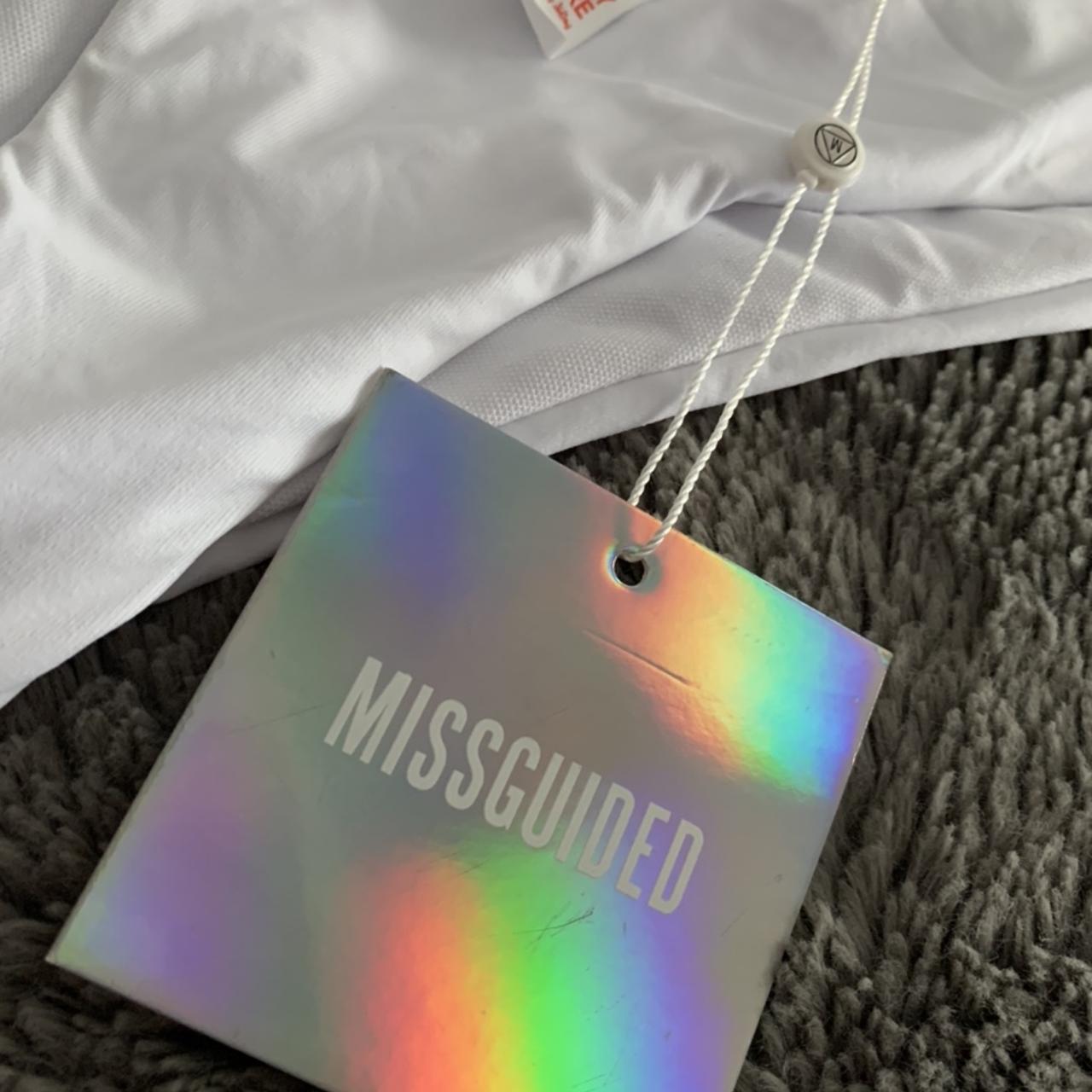 White Missguided cheeky bikini bottoms in size 10.... - Depop