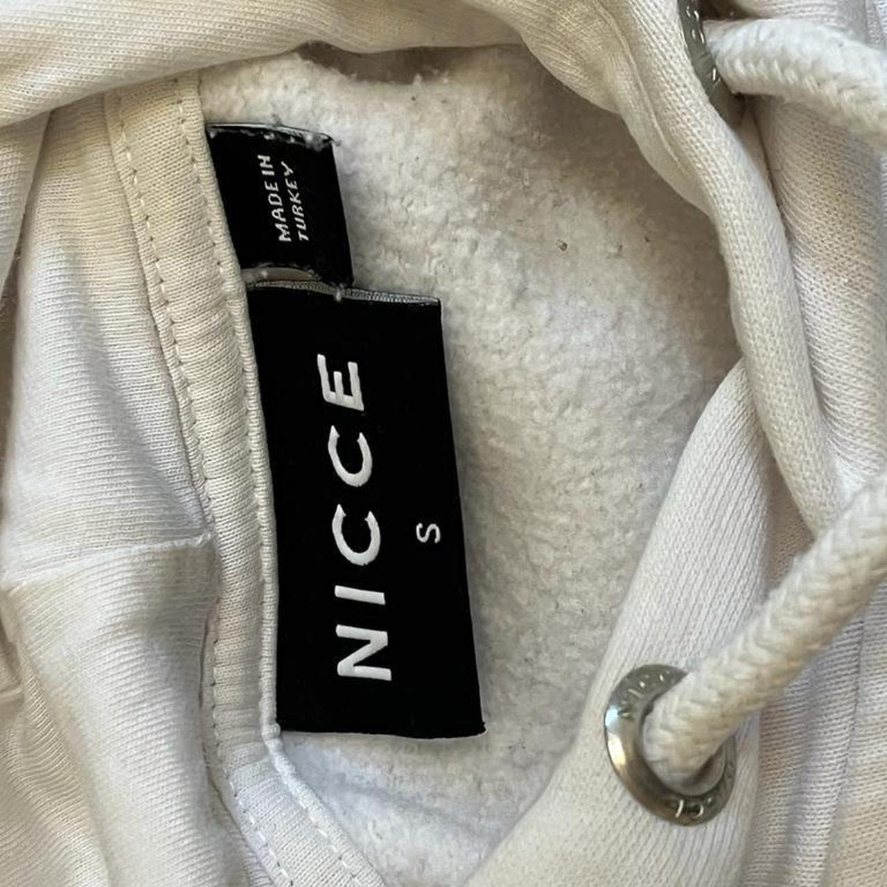 White Nicce hoodie with reflective strip #nicce... - Depop