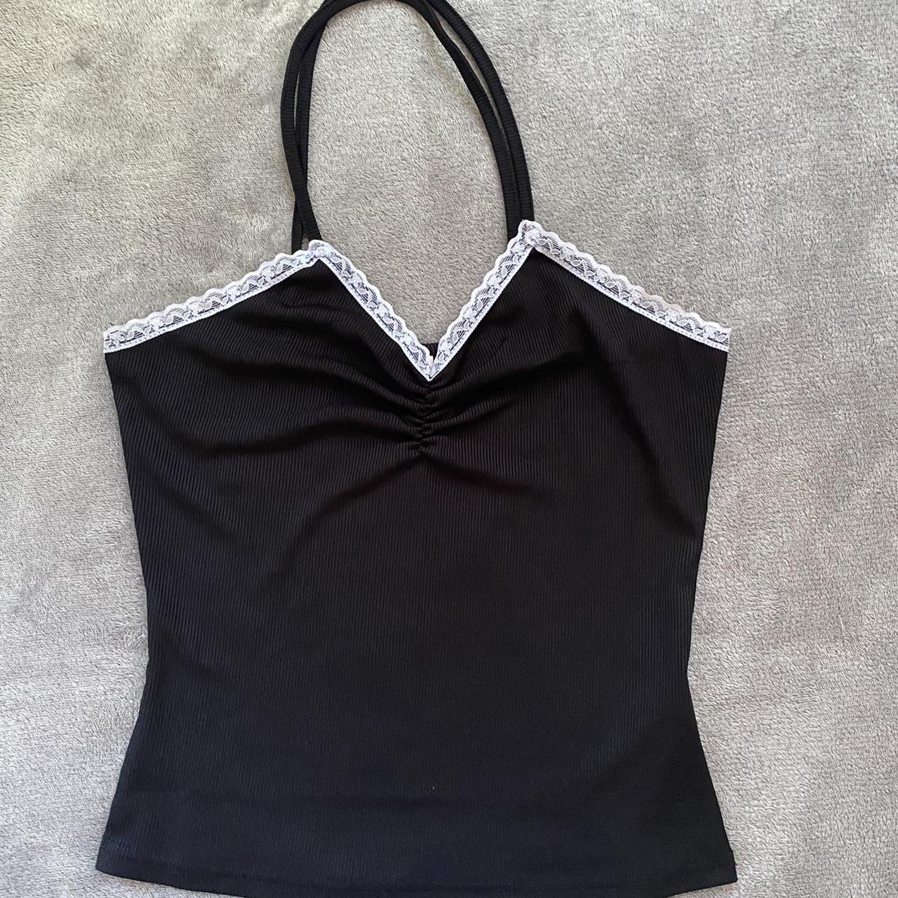 •black cami with white lace trim and cross... - Depop