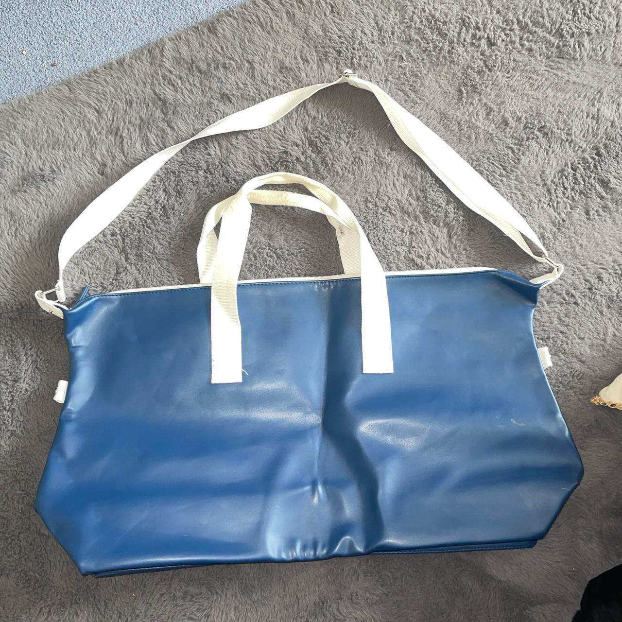 Blue and white Calvin Klein duffle bag Only a few... - Depop