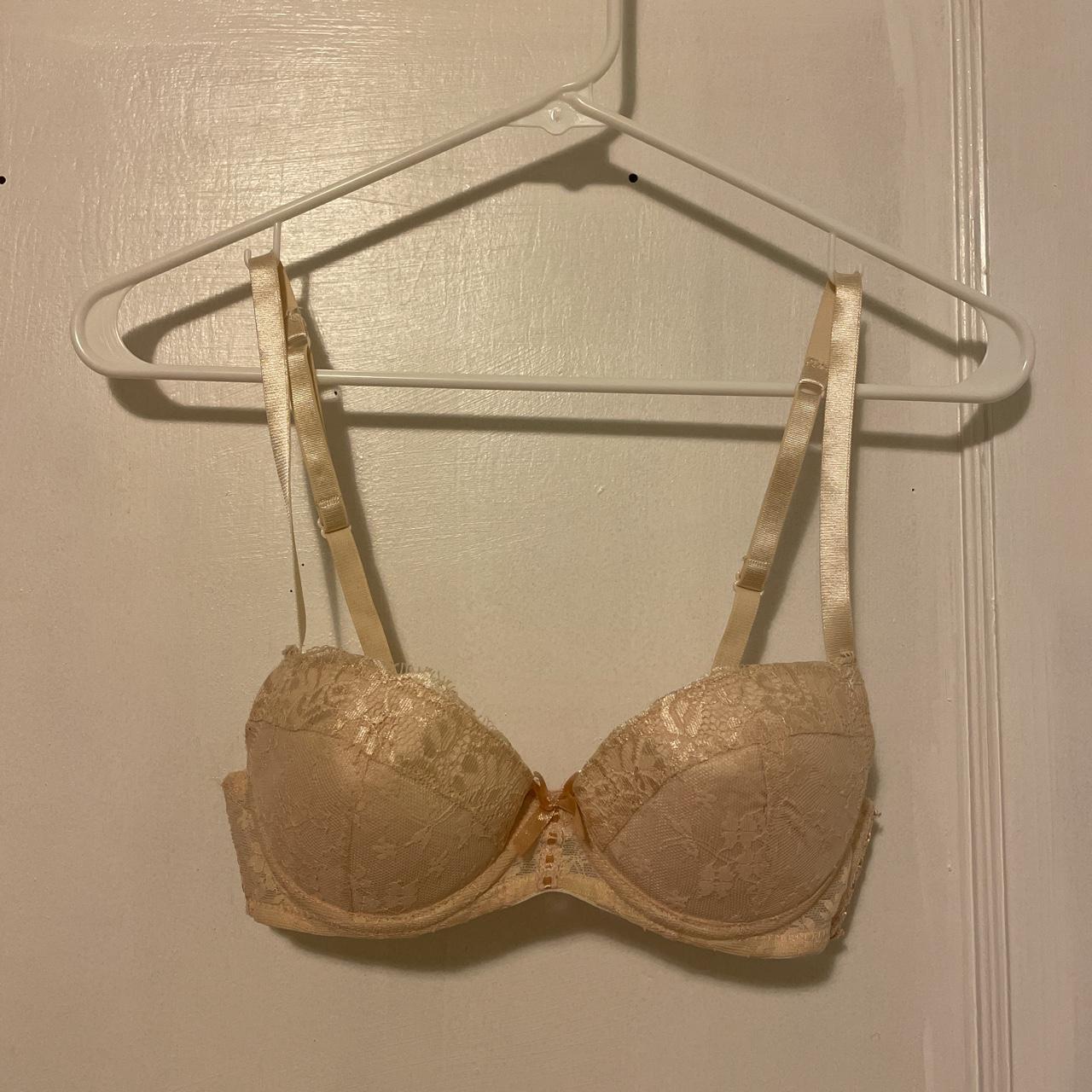 good condition light peach color bra with lace and... - Depop