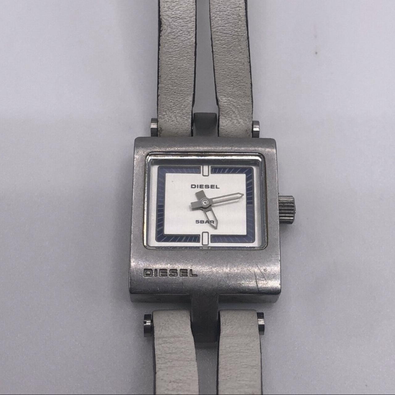 diesel silver watch with white leather wrist band... - Depop