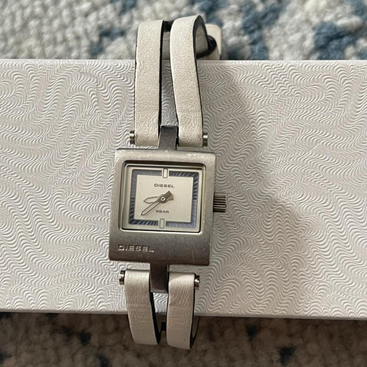 diesel silver watch with white leather wrist band... - Depop