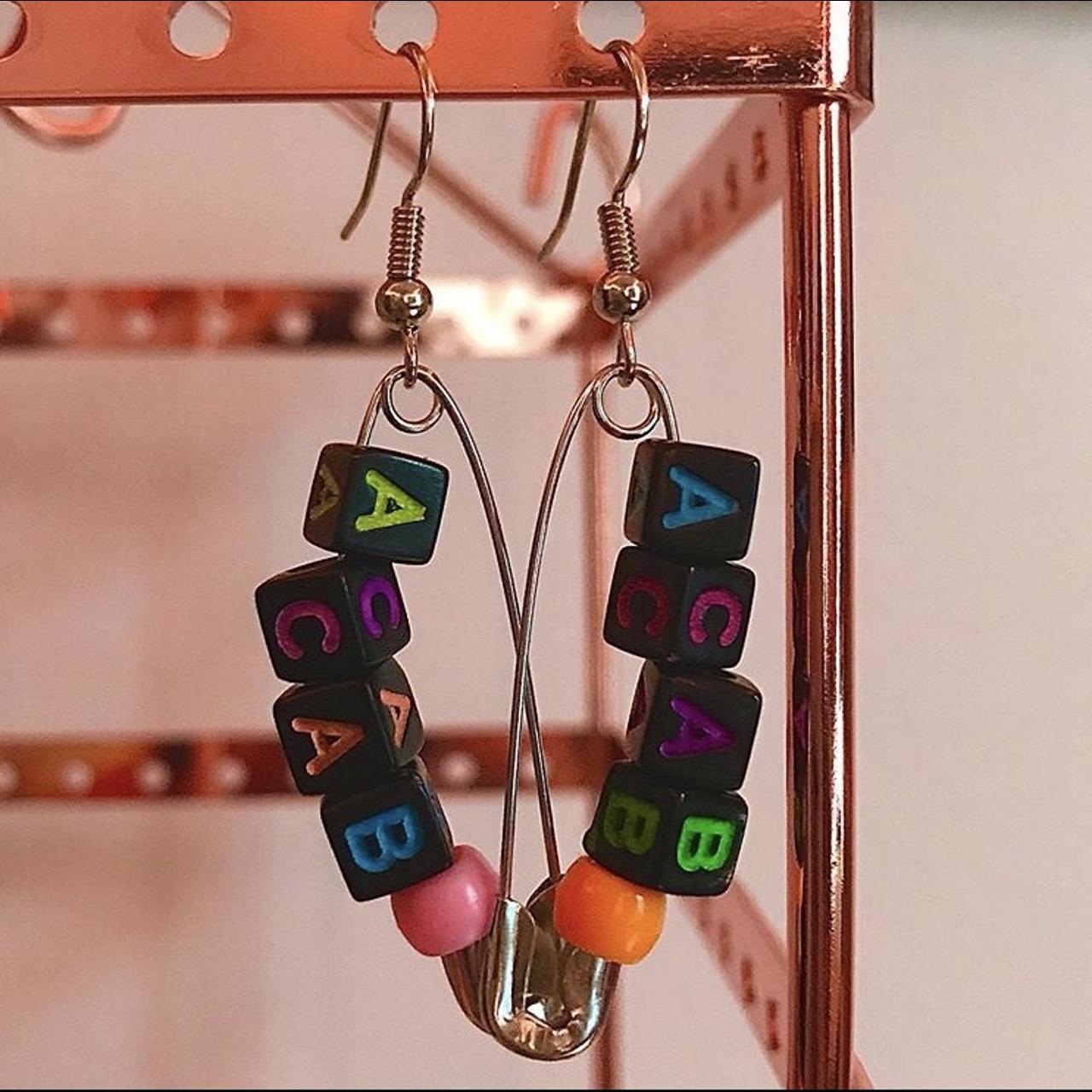 Safety Pin earrings with the word ACAB! ☮️ US... - Depop