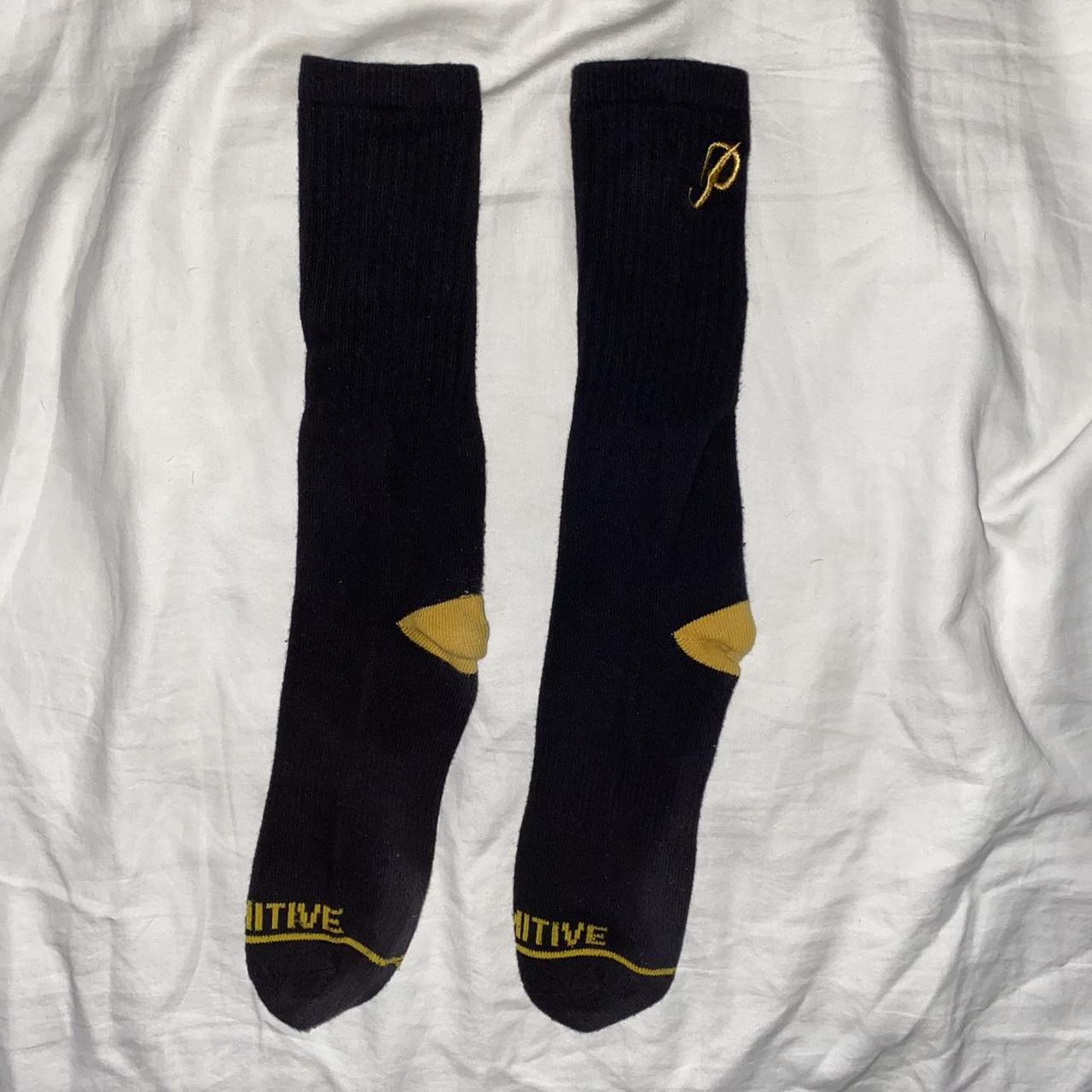 Primitive Men's Black and Gold Socks | Depop