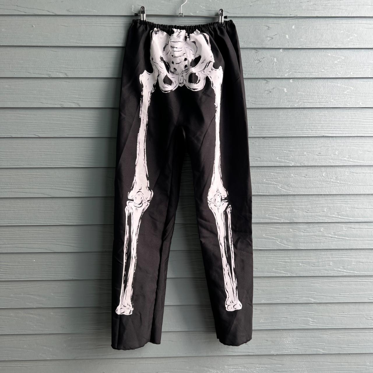 Spirit Halloween unisex skeleton leg bone pants.... - Depop