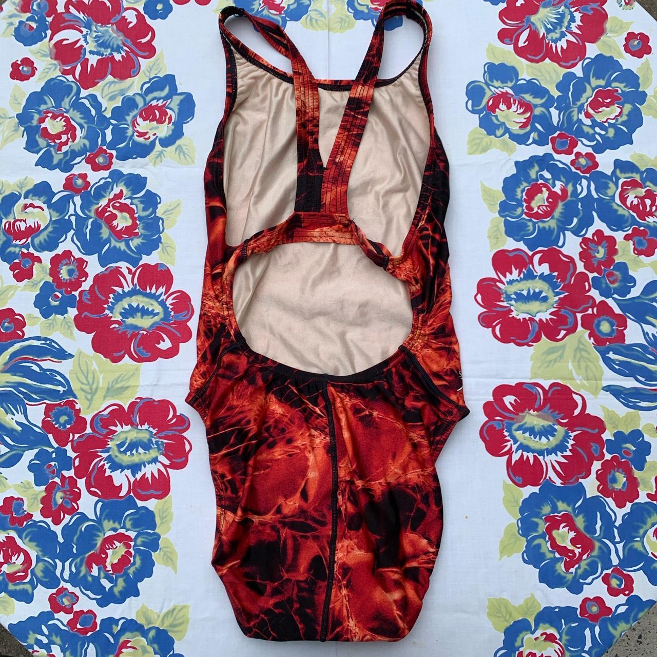 Lava print speedo one piece, 22” from scoop neck to... - Depop