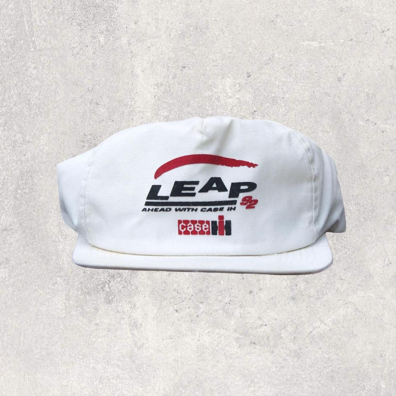 “LEAP” 80s VINTAGE TRUCKER SNAPBACK HAT IN WHITE... - Depop