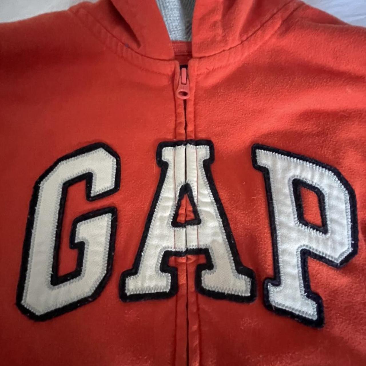 GAP Orange zip up Fits a size small - Depop