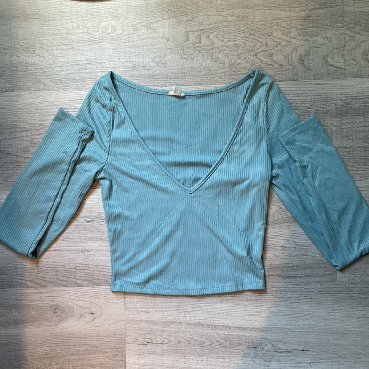 Cute turquoise long sleeve crop top. Never worn.... - Depop