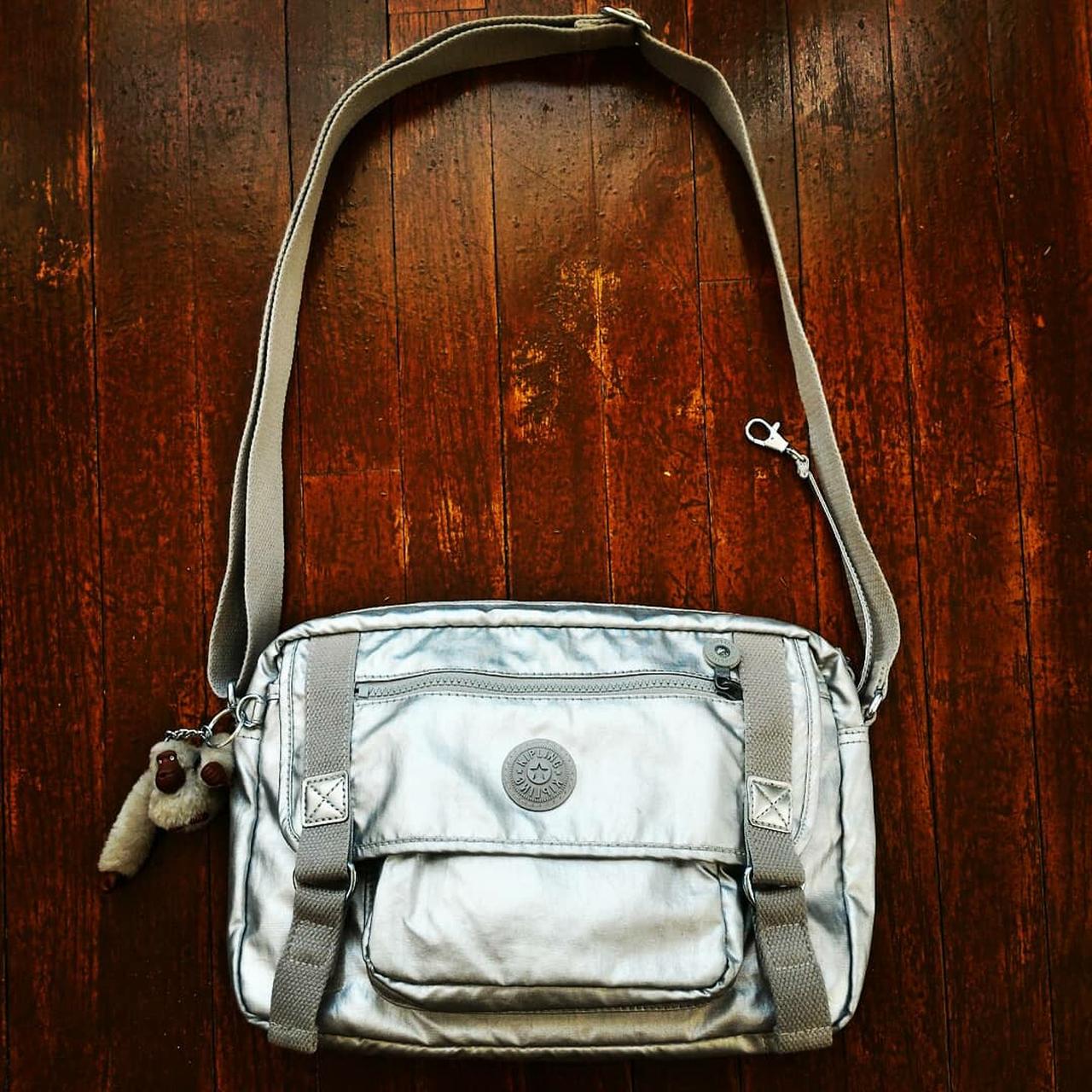 Kipling Unisex Medium Silver Cross body Bag. Nylon,... - Depop