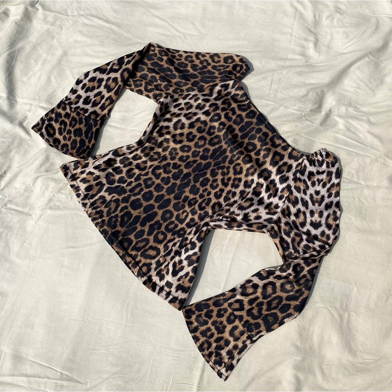 VIP Leopard print top Fluted 3/4 length... - Depop