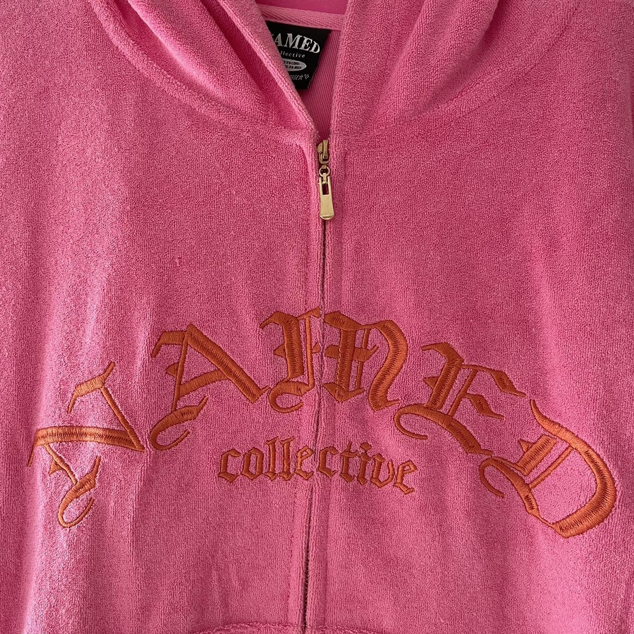 Pink named collective zip up hoodie Would best fit a... - Depop