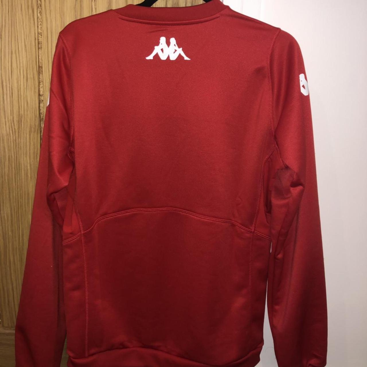 Red Kappa Jumper with logo on both shoulders and... - Depop