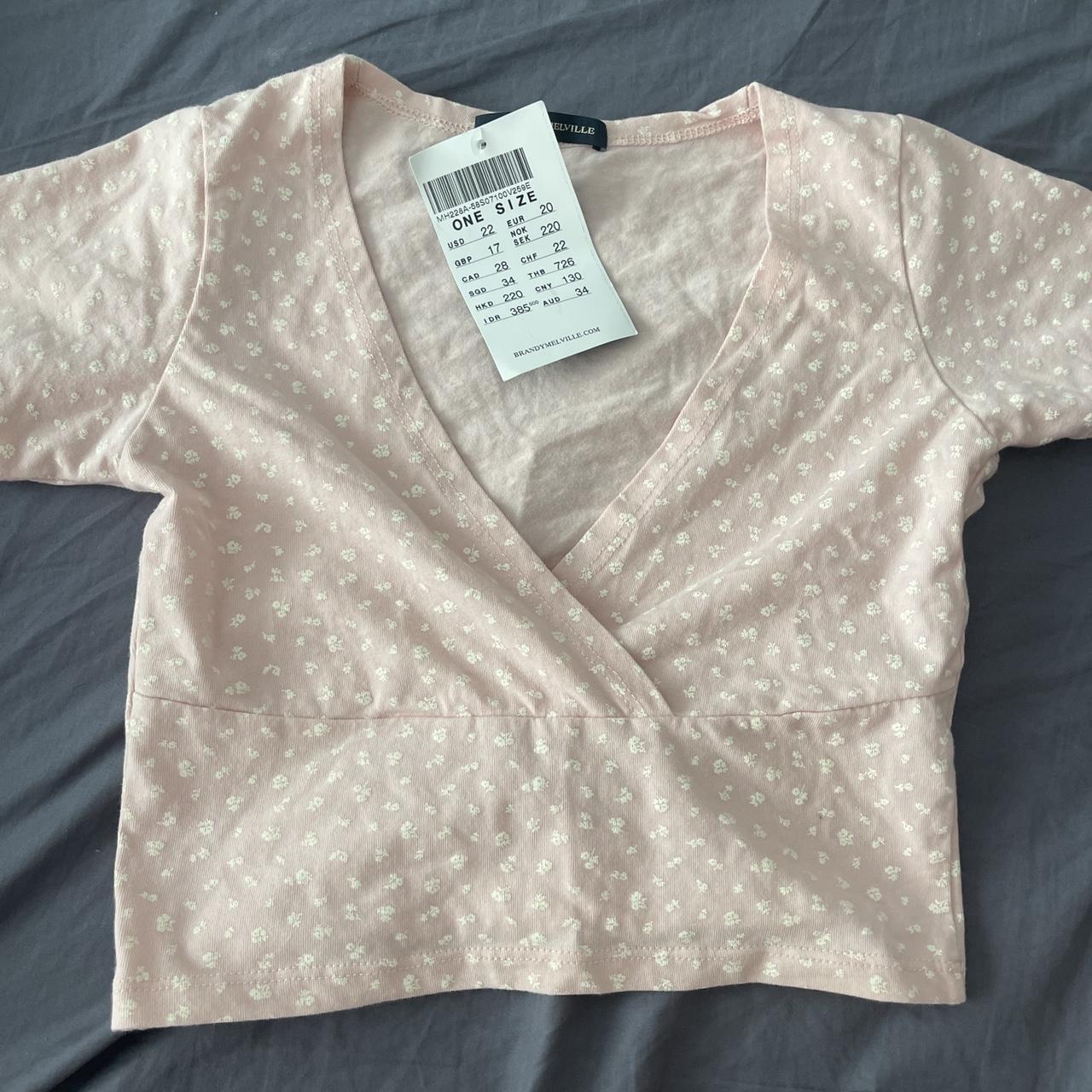 Pink brandy Melville top -never worn & new with tag - Depop
