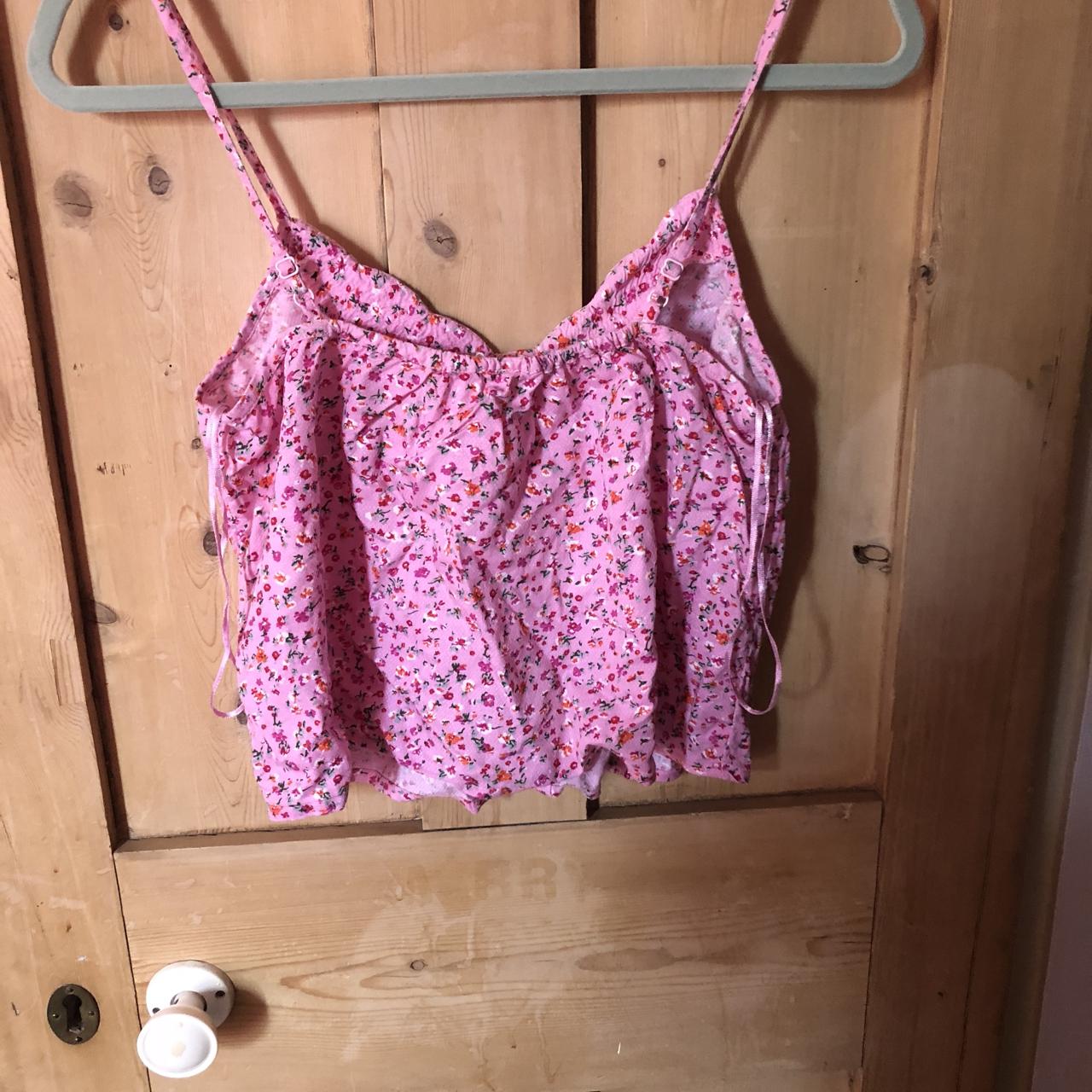 Pink floral crop top with buttons down the front... - Depop