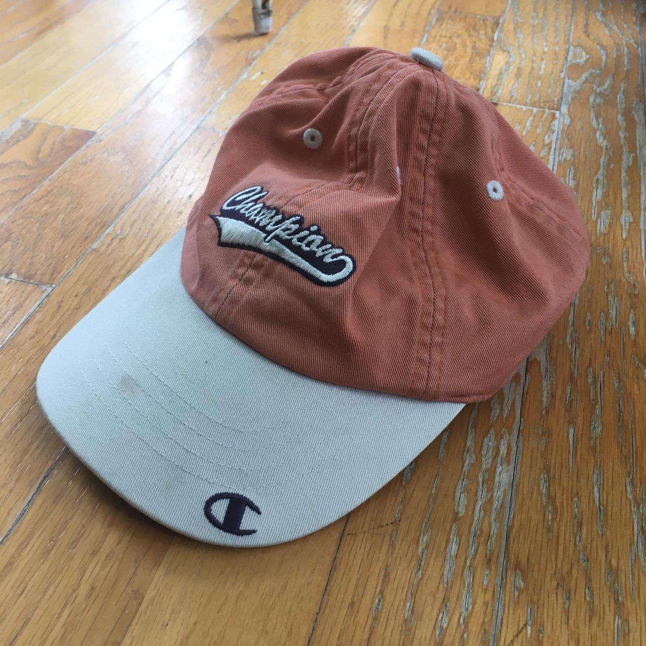 Pastel pink Champion dad cap hat. Signs of wear, but... - Depop