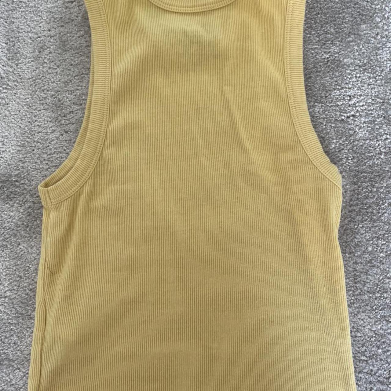 Yellow ribbed tank from urban Worn but no... - Depop