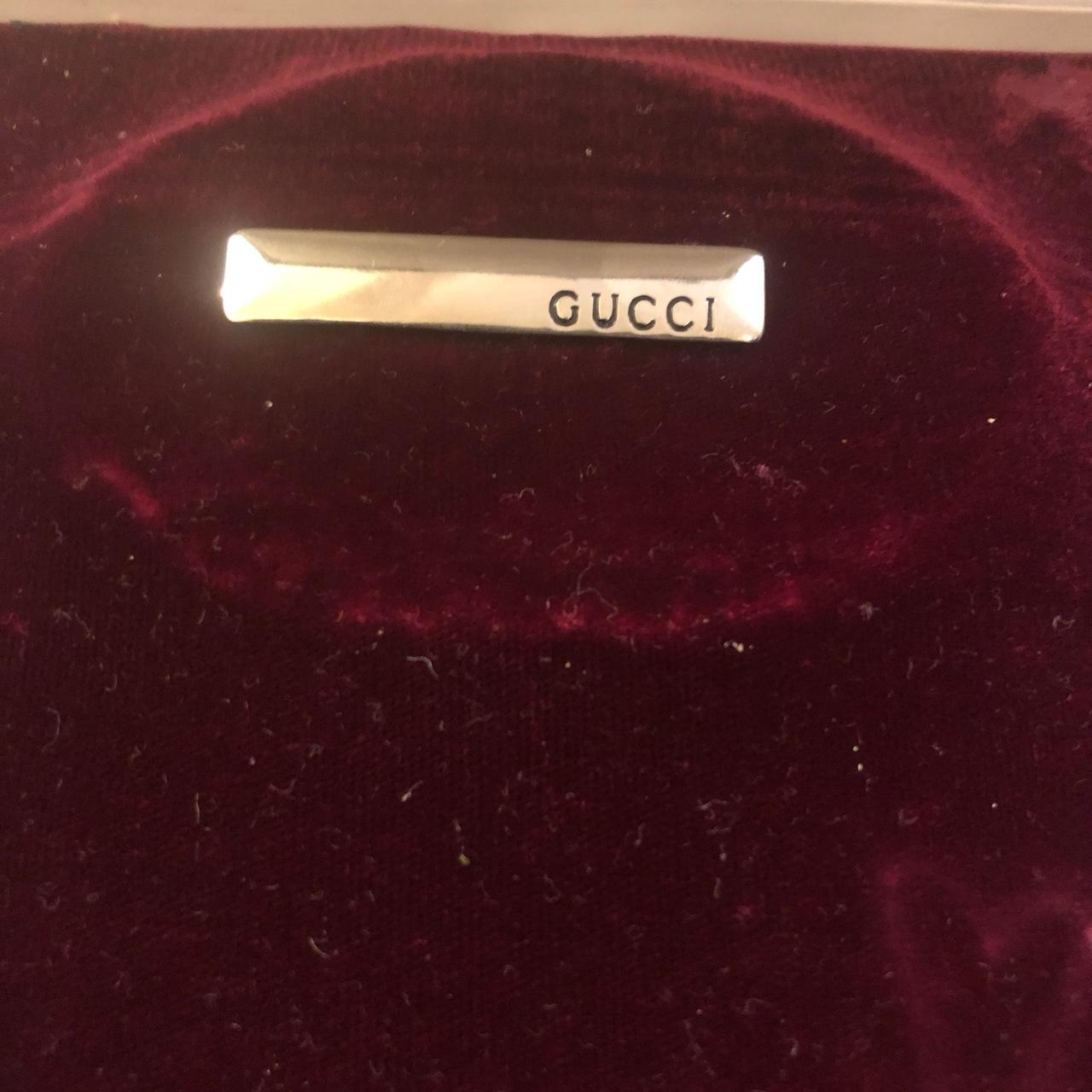 Authentic Gucci badge. Was on an authentic Gucci... - Depop
