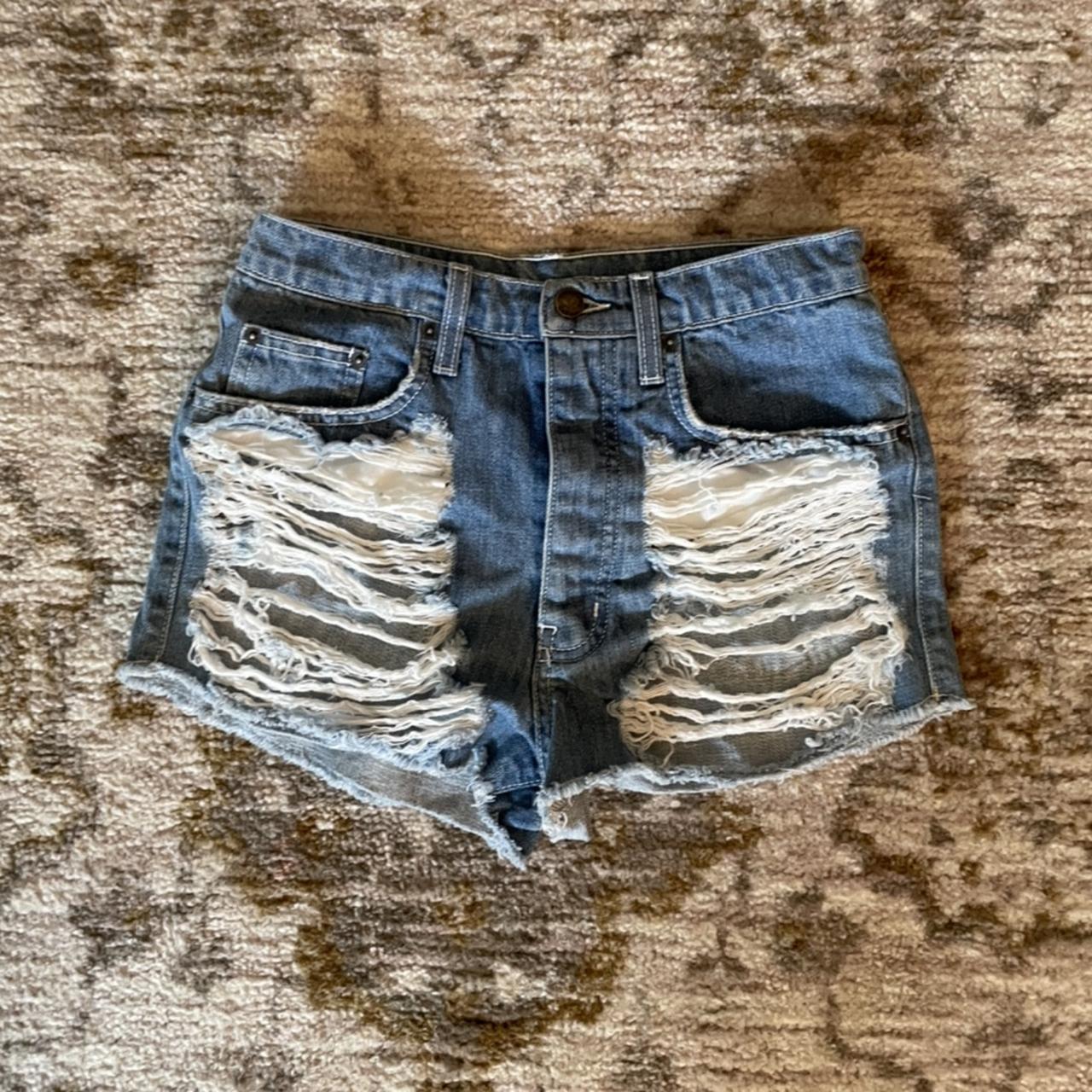 Distressed ripped high-waisted denim shorts Marked... - Depop