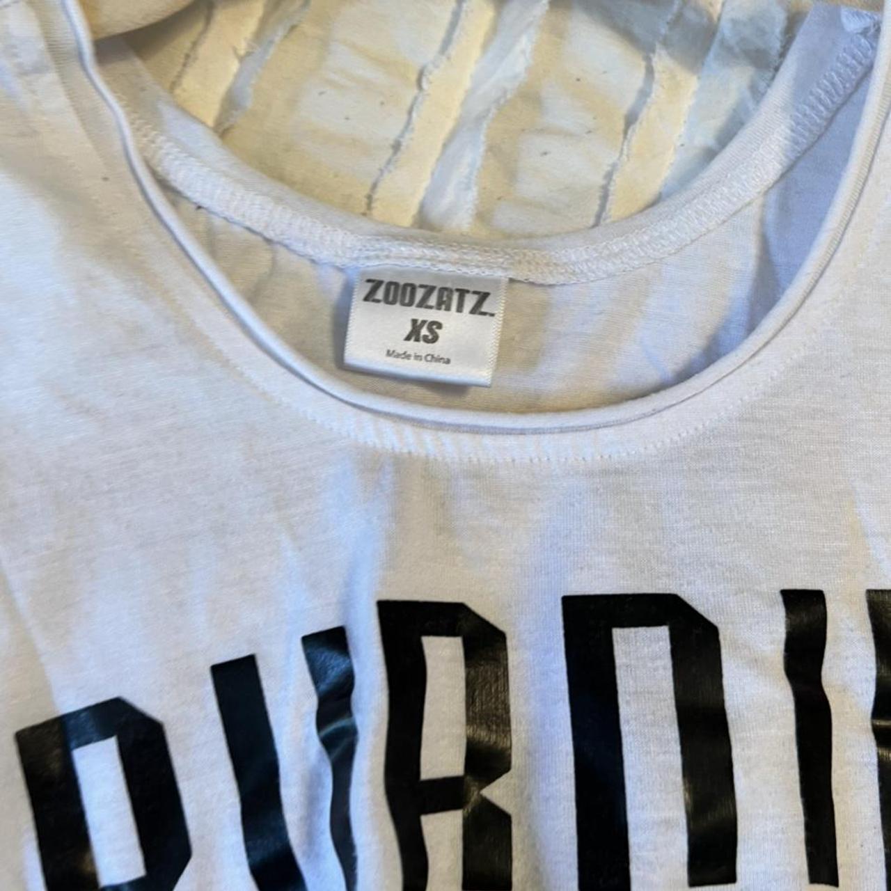 Purdue cropped white tank Soft, loose fit material... - Depop