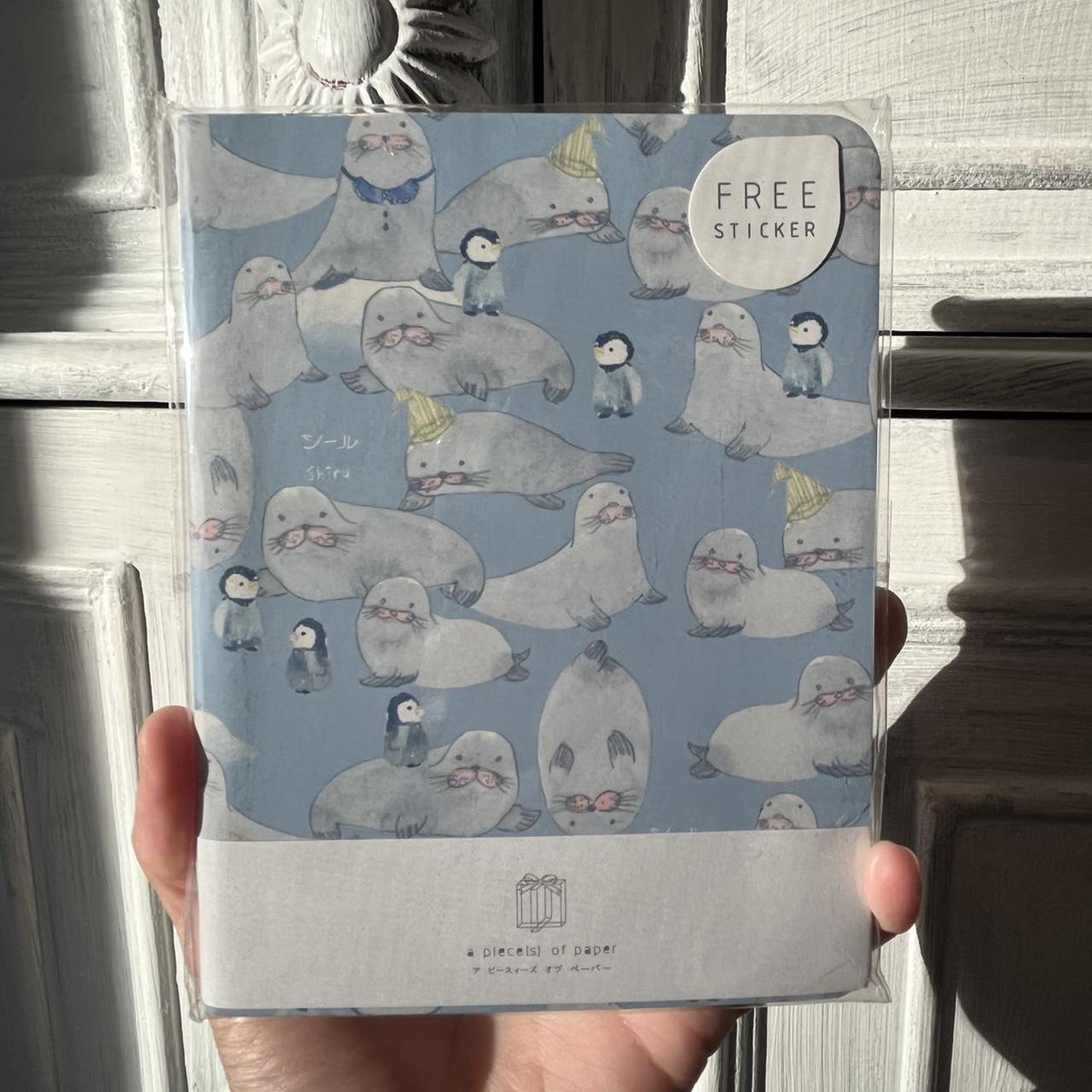 seal/baby penguin notebook, lined paper. Condition:... - Depop
