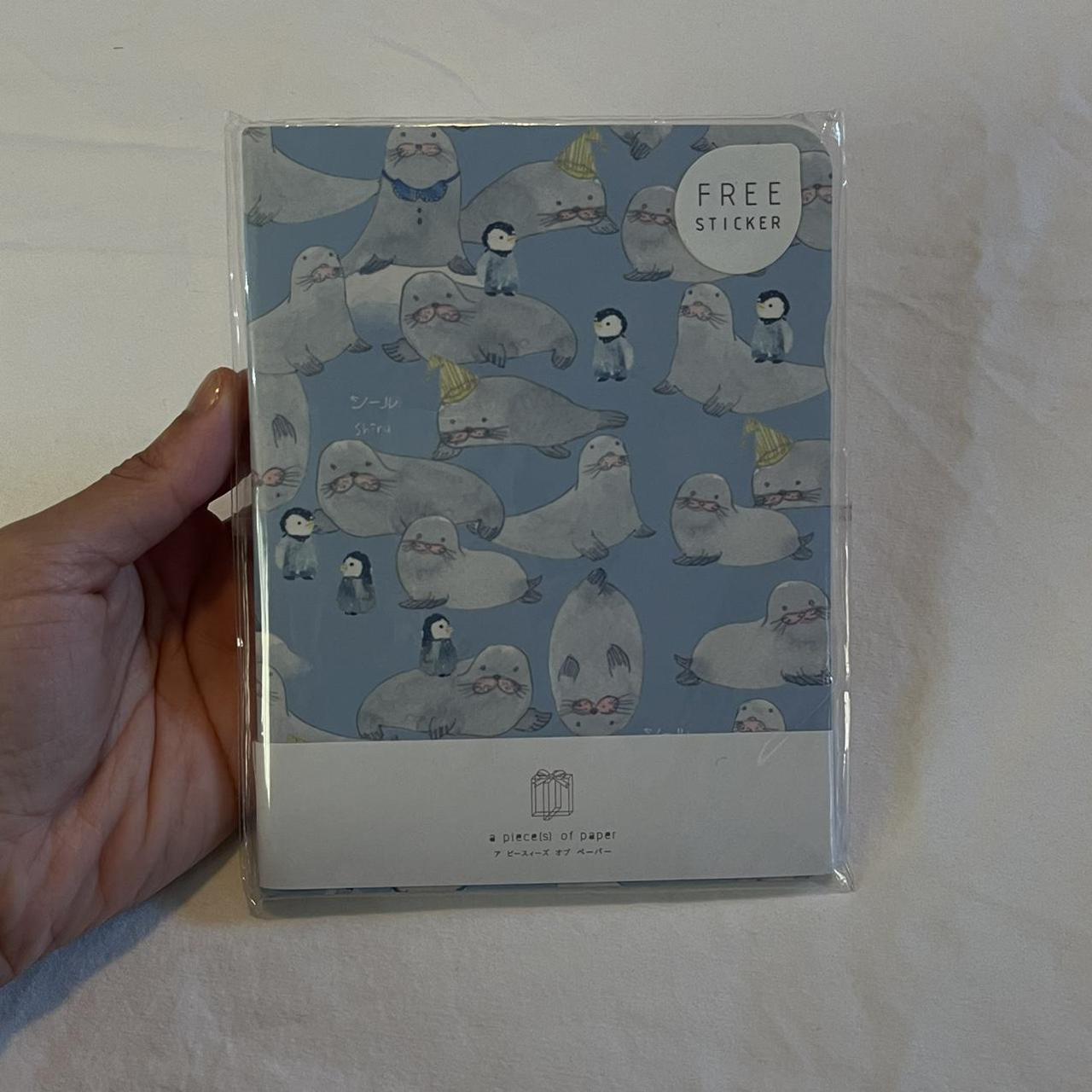 seal/baby penguin notebook, lined paper. Condition:... - Depop