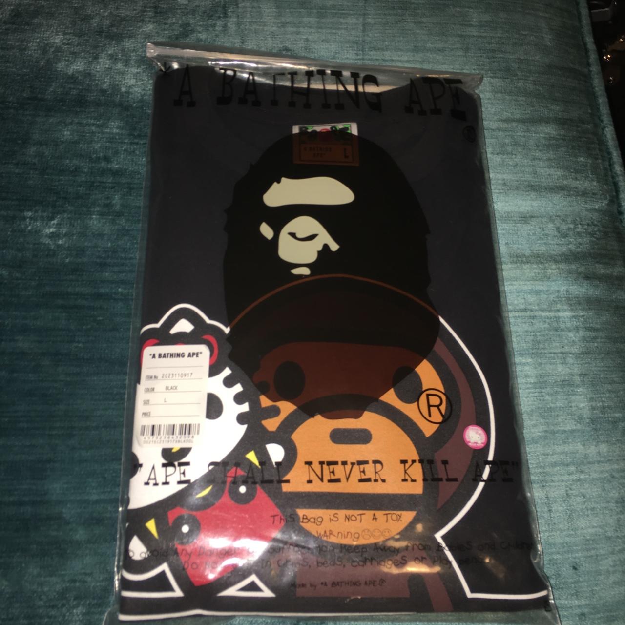 Baby Milo x Hello Kitty black tee, brand new never... - Depop