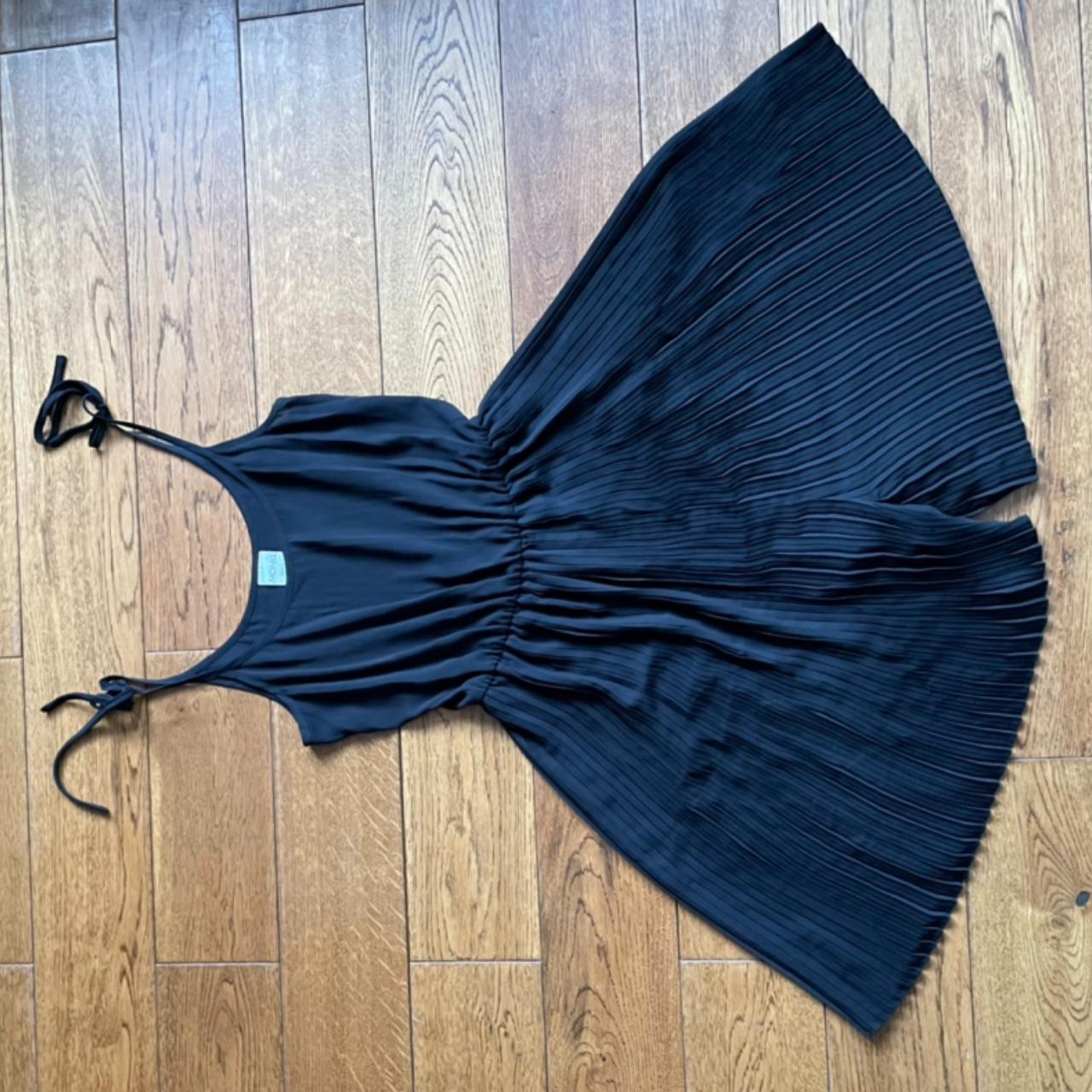 Monki UK XS black playsuit. Item is a sheer... - Depop