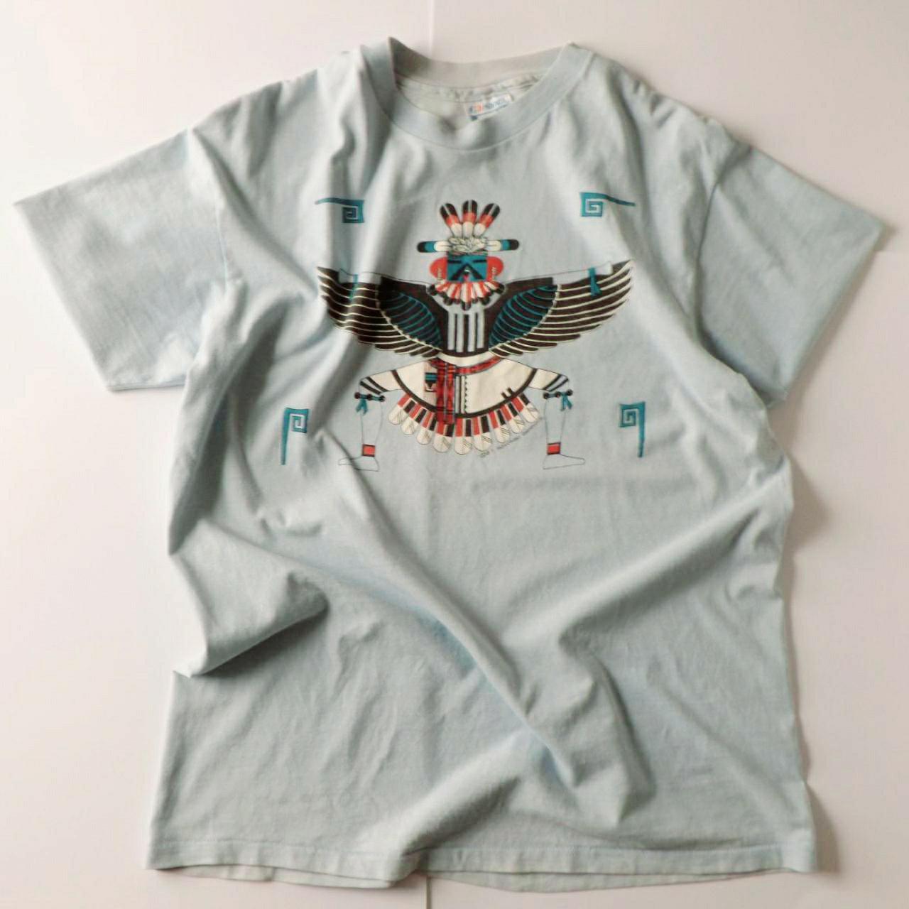 Pale blue Hanes Aztec Firebird style graphics. 1987... - Depop